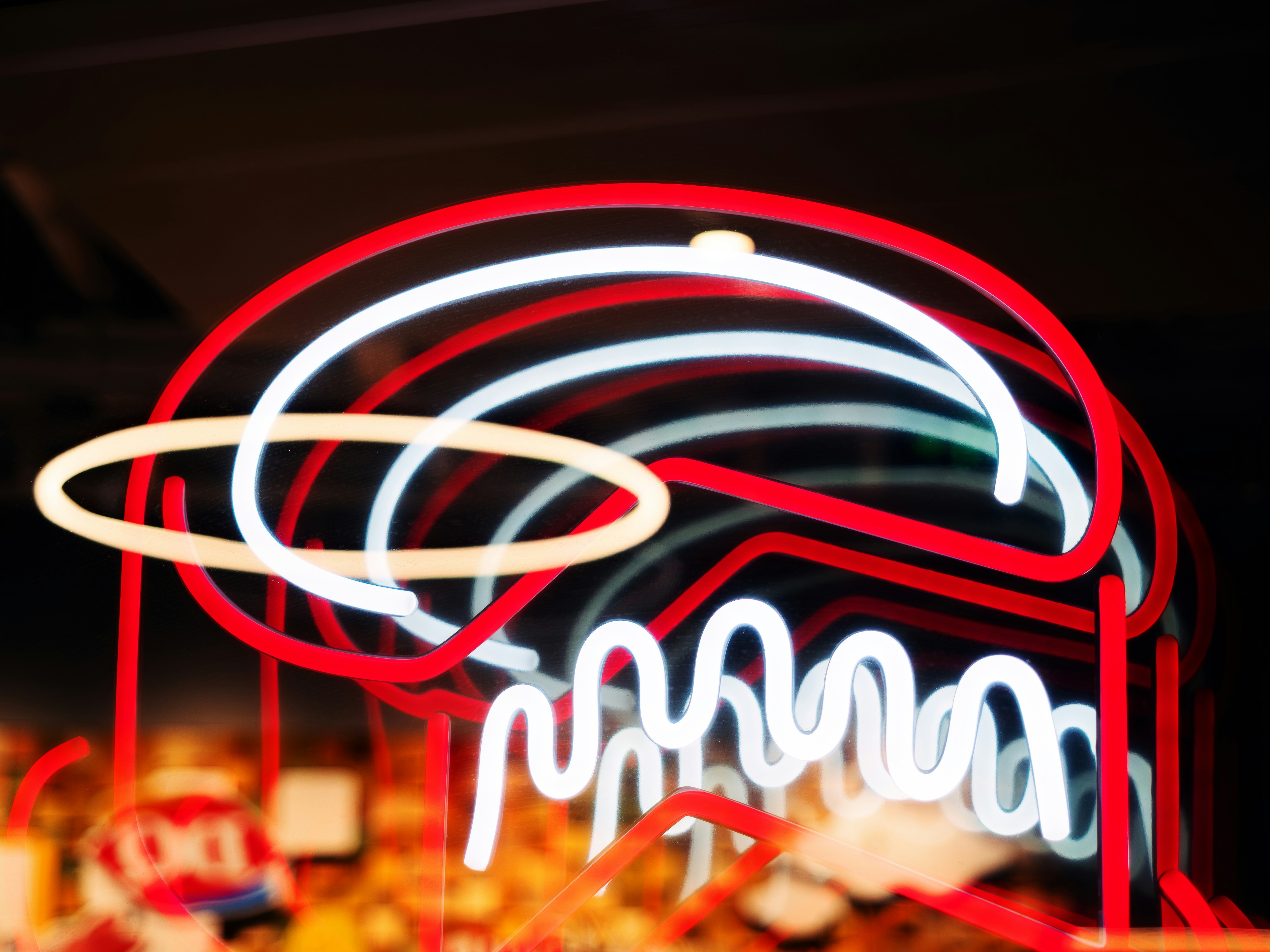 Neon Whimsy: Circular Loops Over a Red Frame