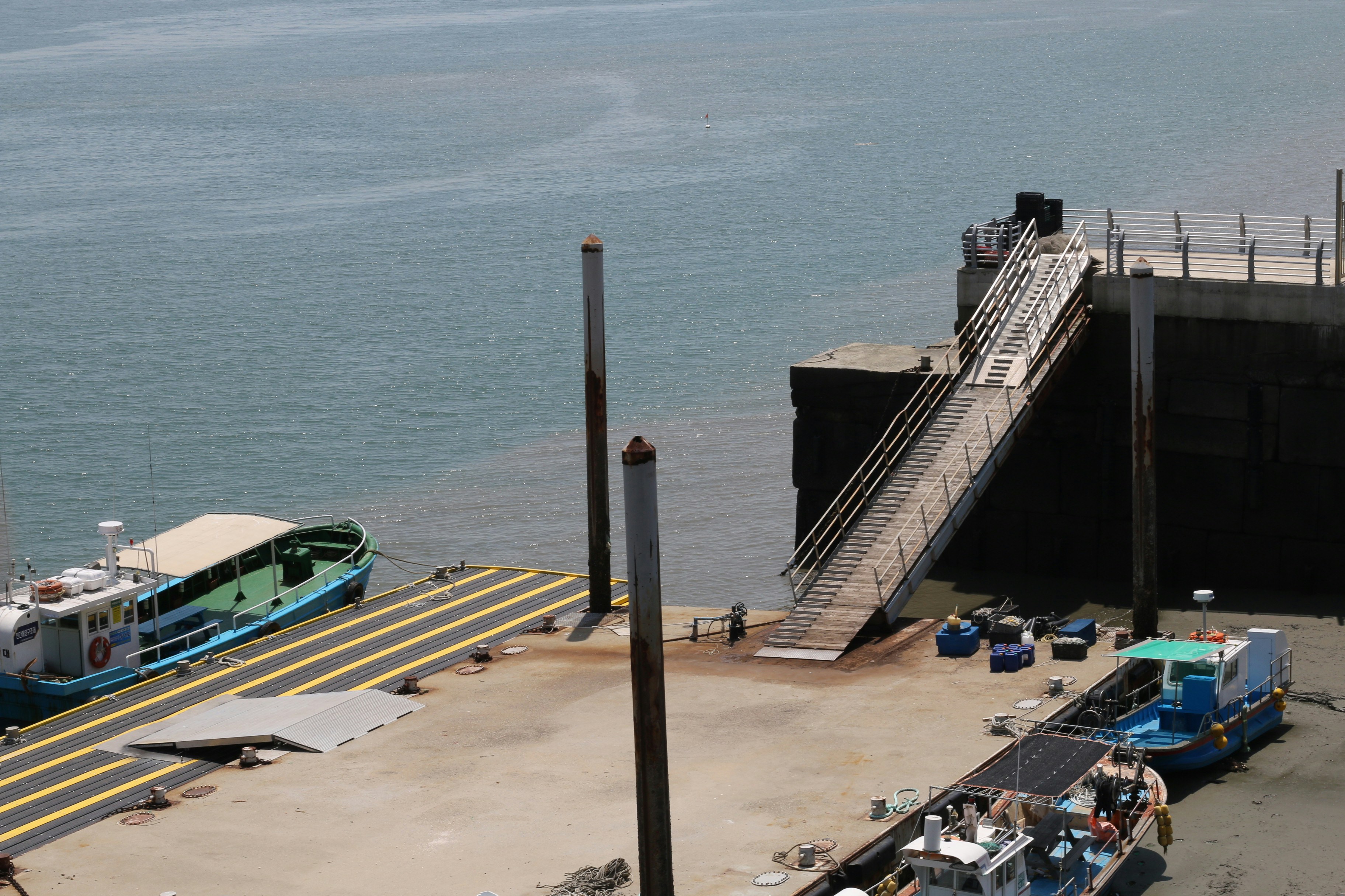 Harbor Staircase Overlooking a Quiet Pier