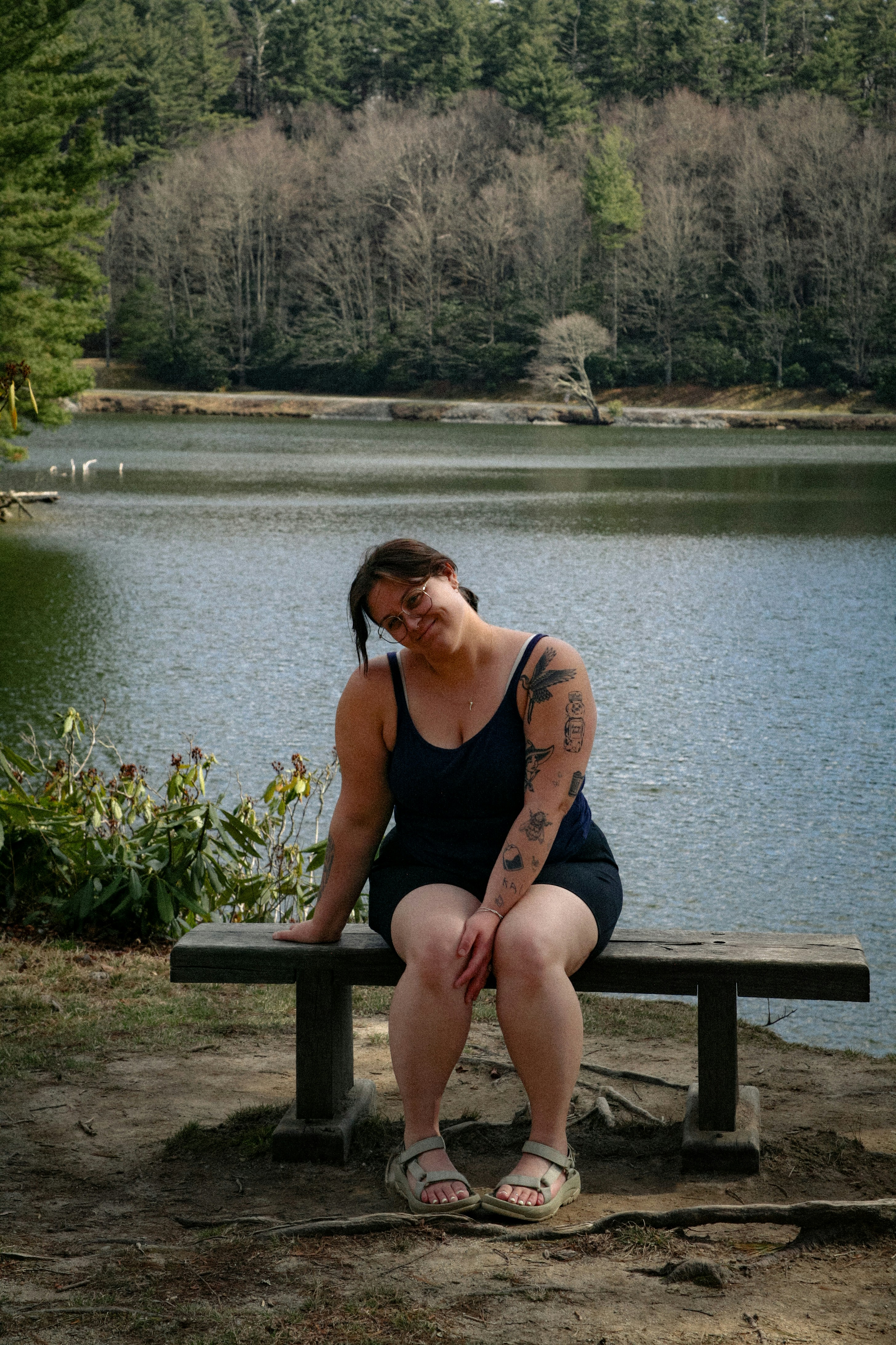 Serene lakeside portrait on a wooden bench