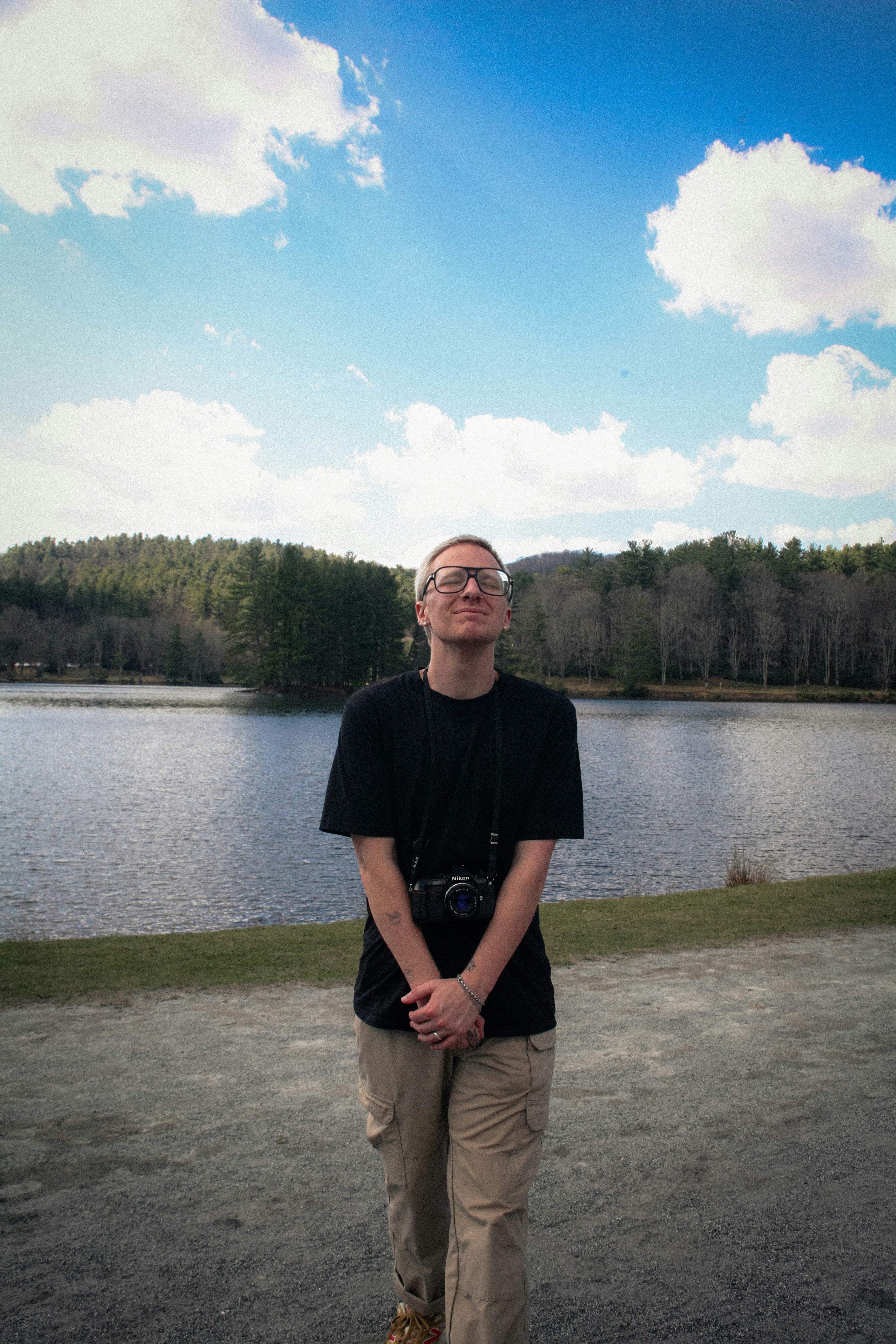 Centered in Calm: a photographer in a lakeside glow