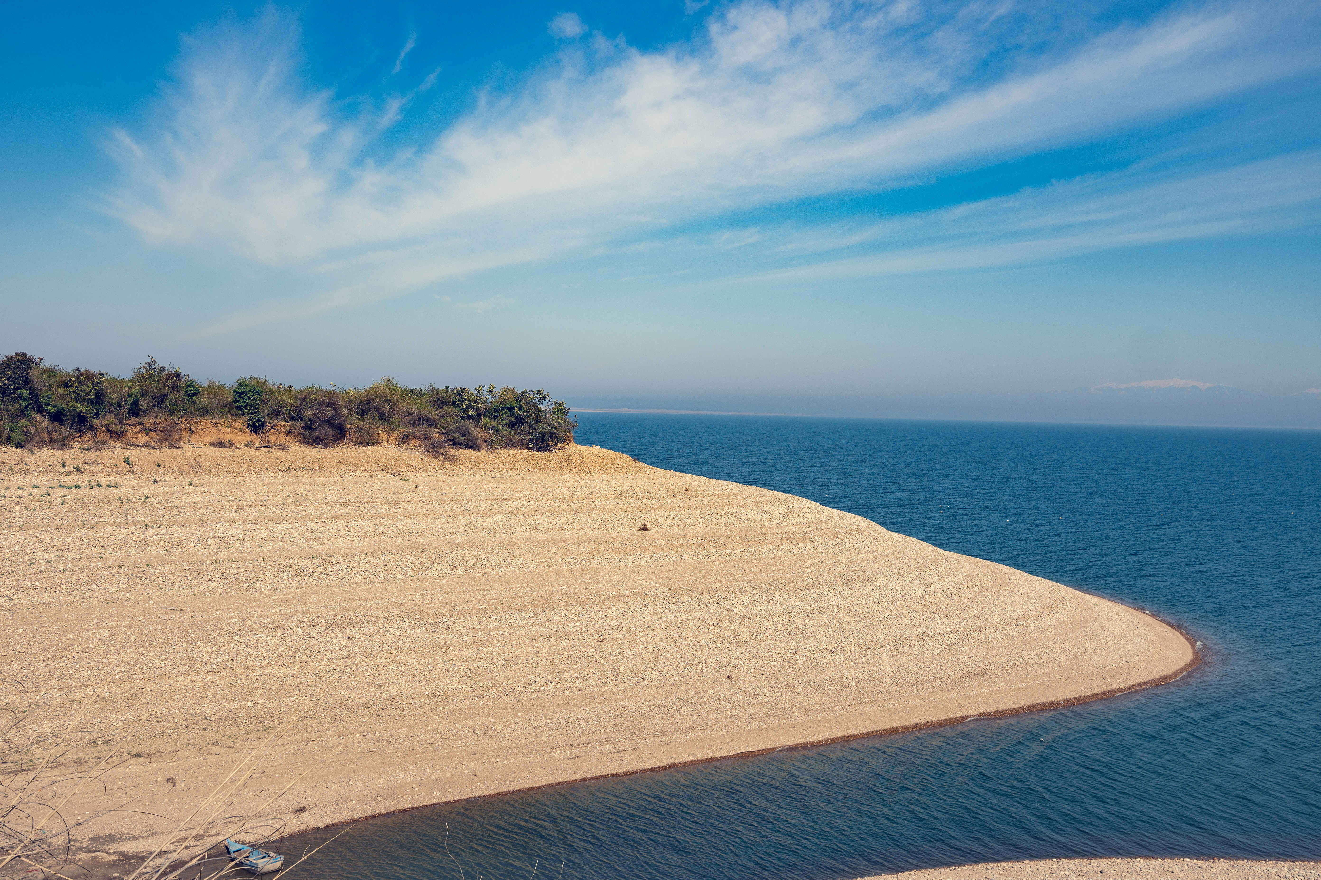 Coastal Curve: A Quiet Shoreline Meeting the Sea