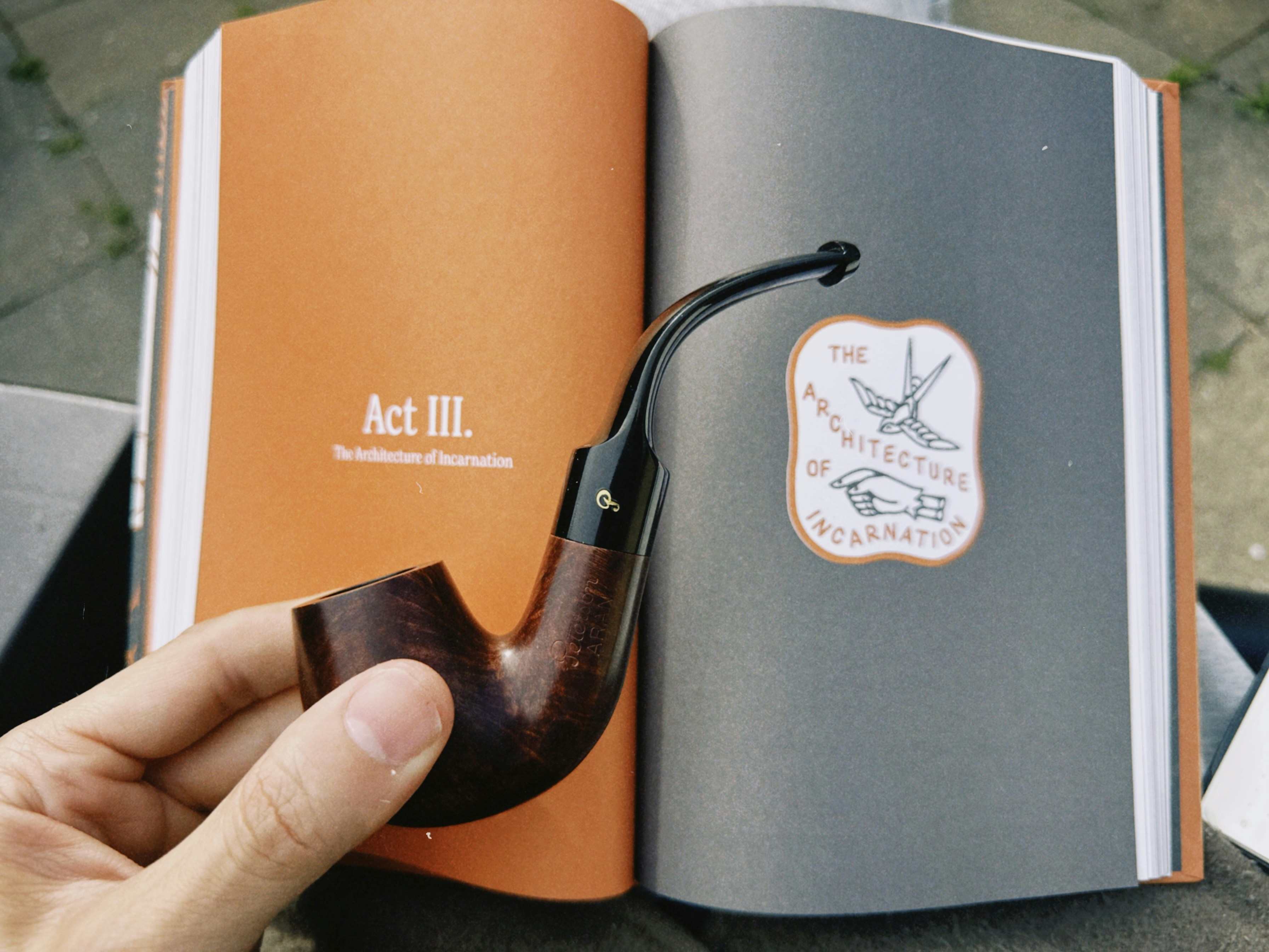 Curved Pipe, Open Book: A Quiet Moment of Study