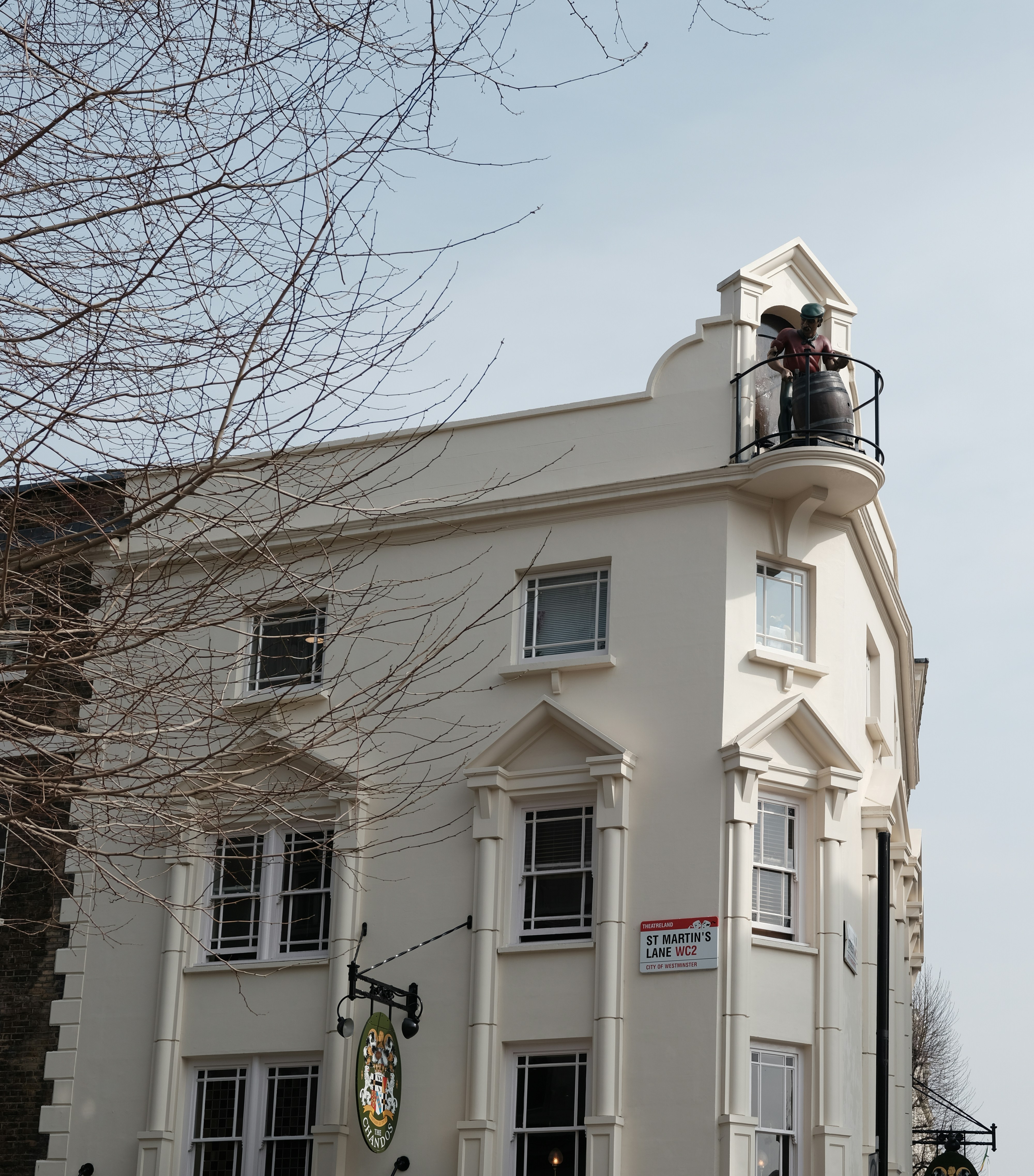 Lighthouse of a City: Photographer on the Bent Balcony
