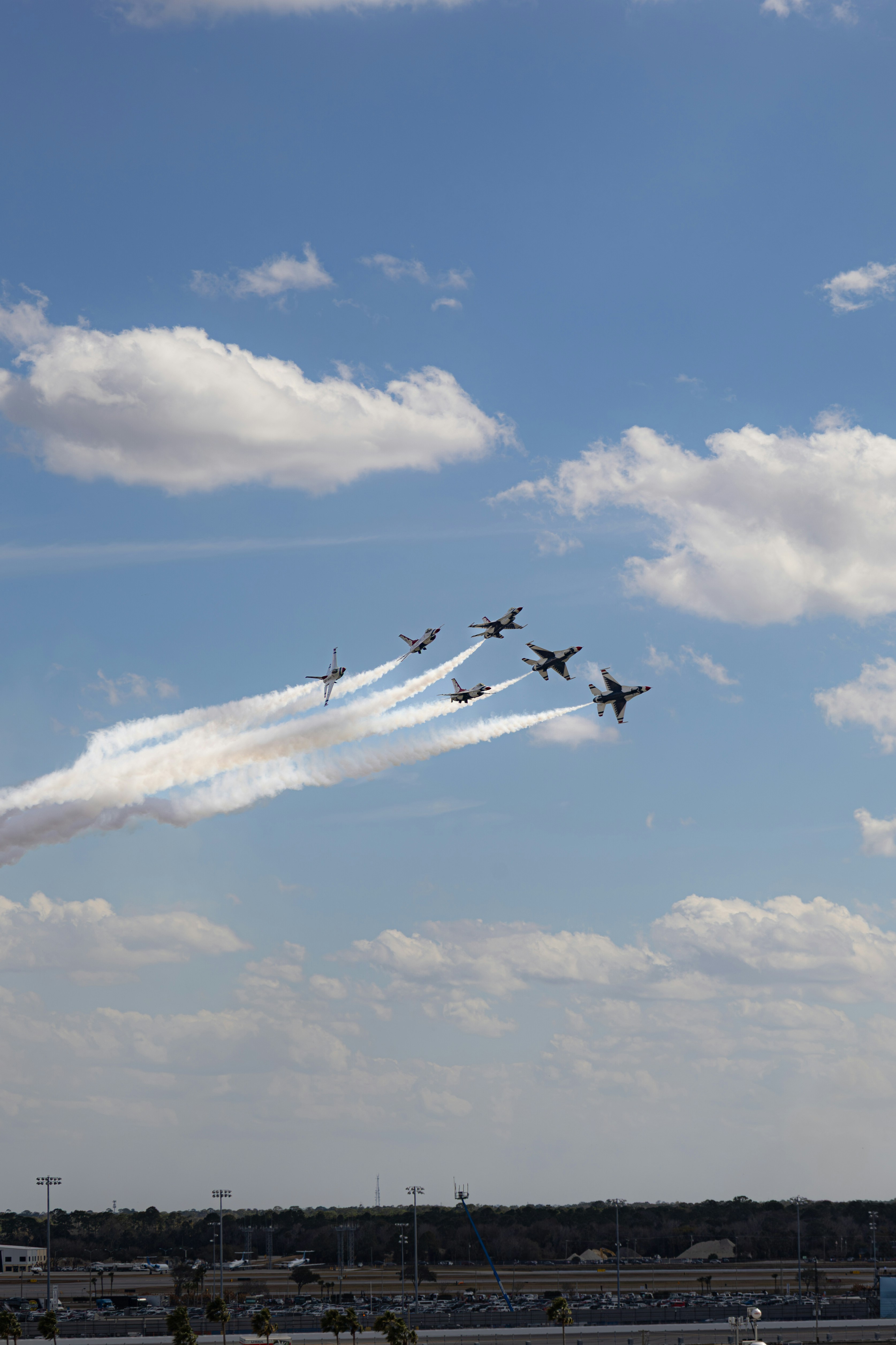 Six Jets Leave Gracious White Trails Against a Clear Sky