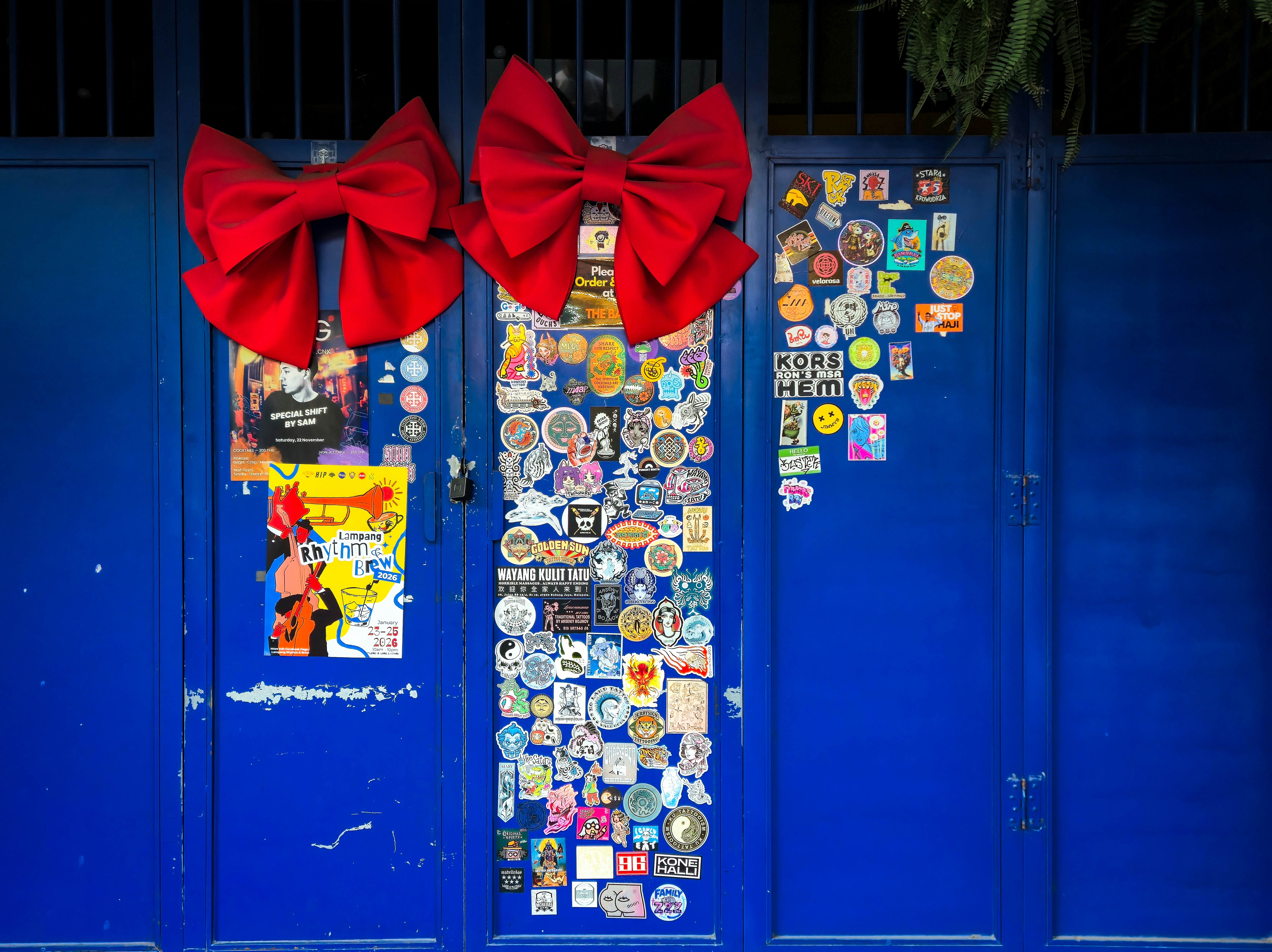 Scarlet Bows Over a Wall of Whimsy