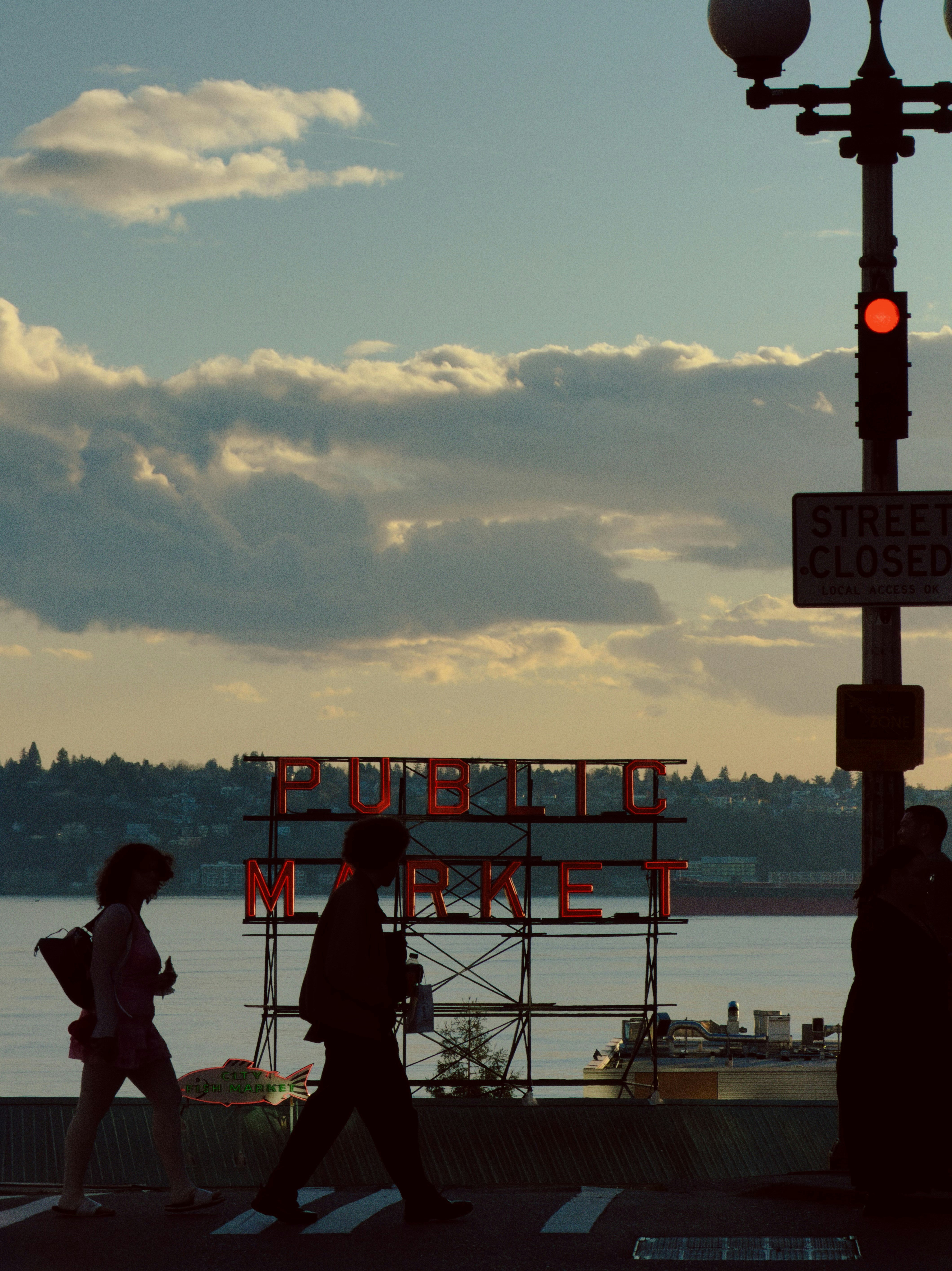 Neon Public Market Silhouette at Sunset
