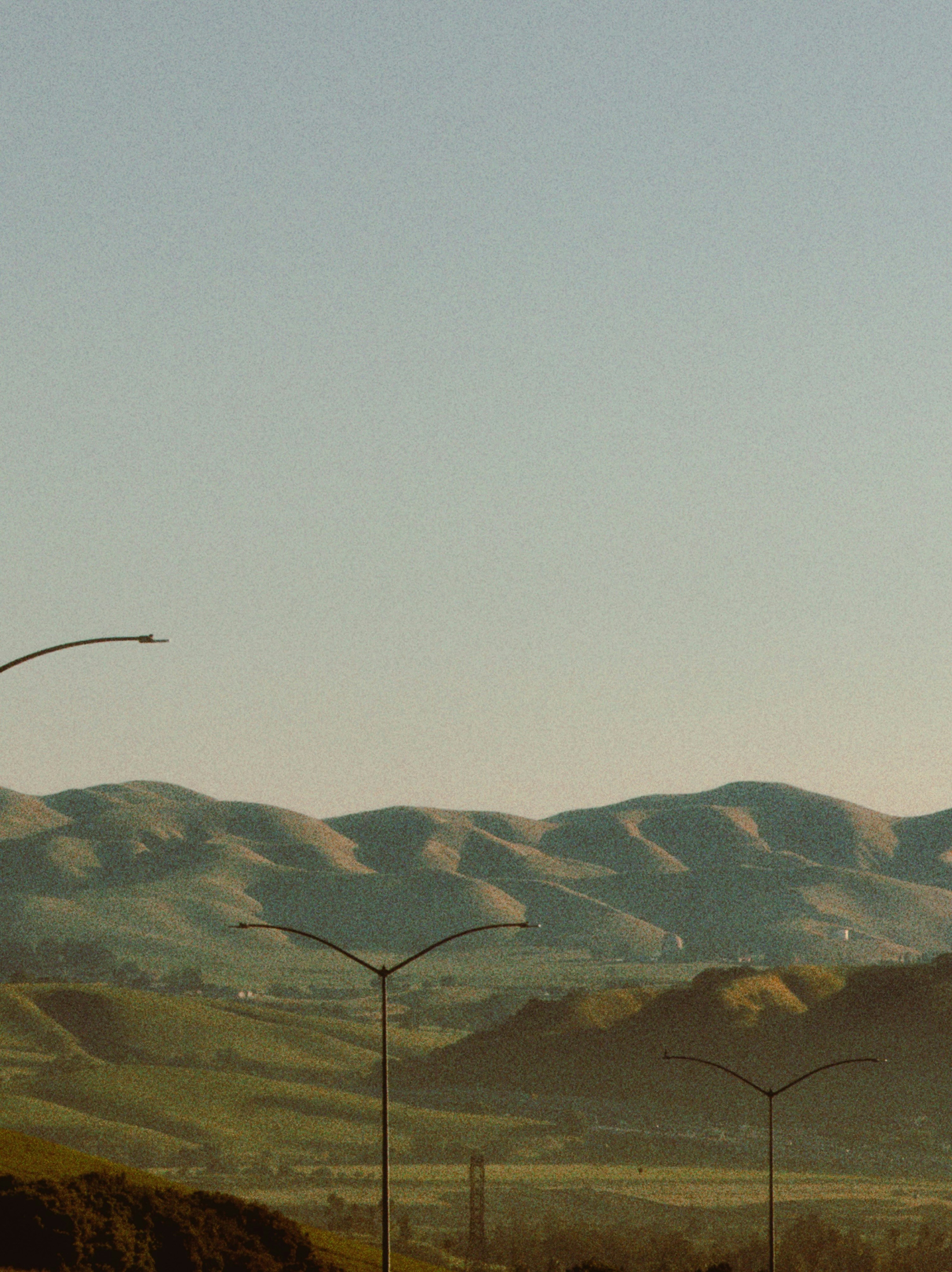 Horizon Chorus: Quiet Hills Under a Pale Sky