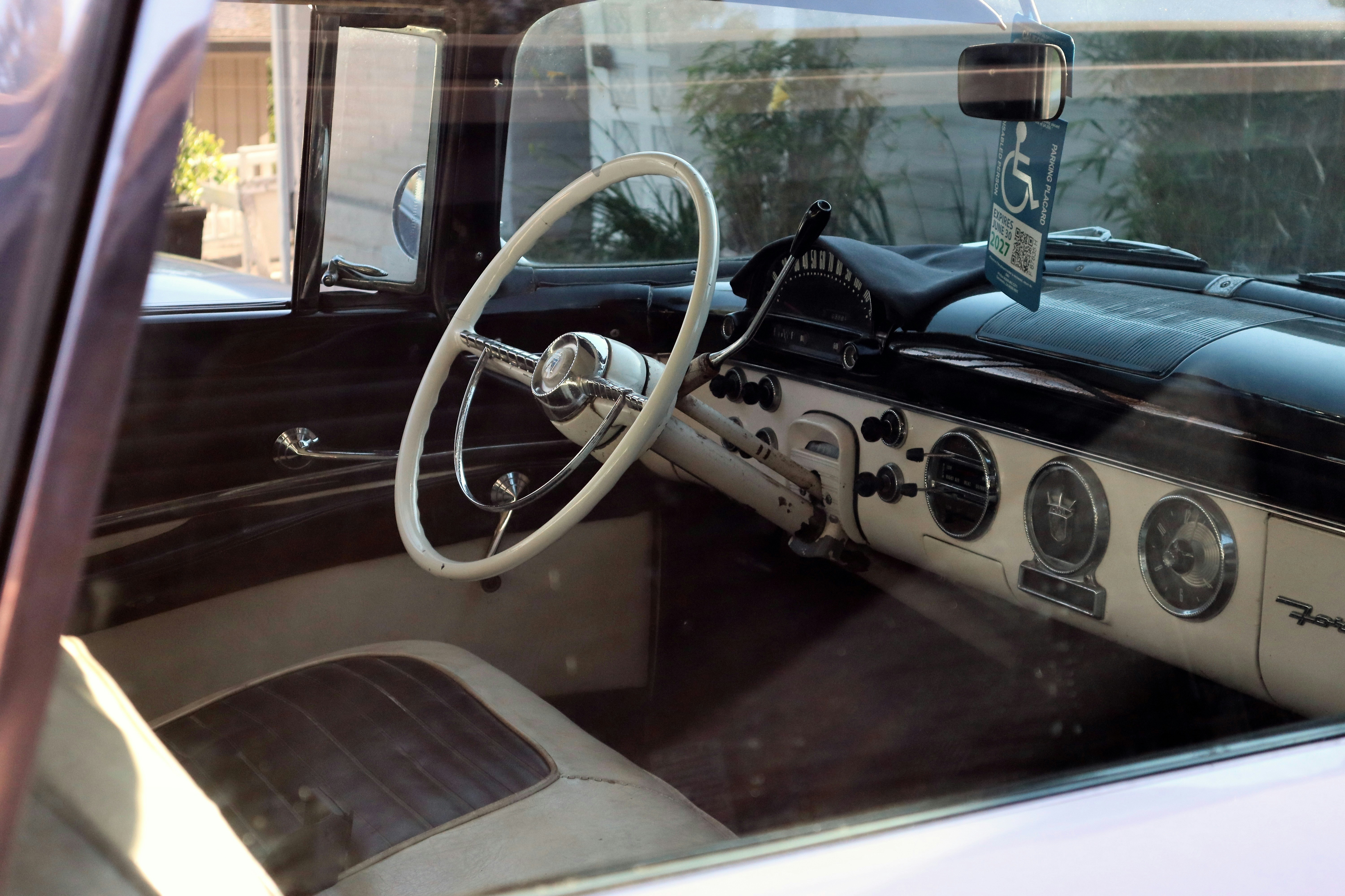 Retro Steering Wheel and Dashboard: A Glimpse into Classic Car Cabin