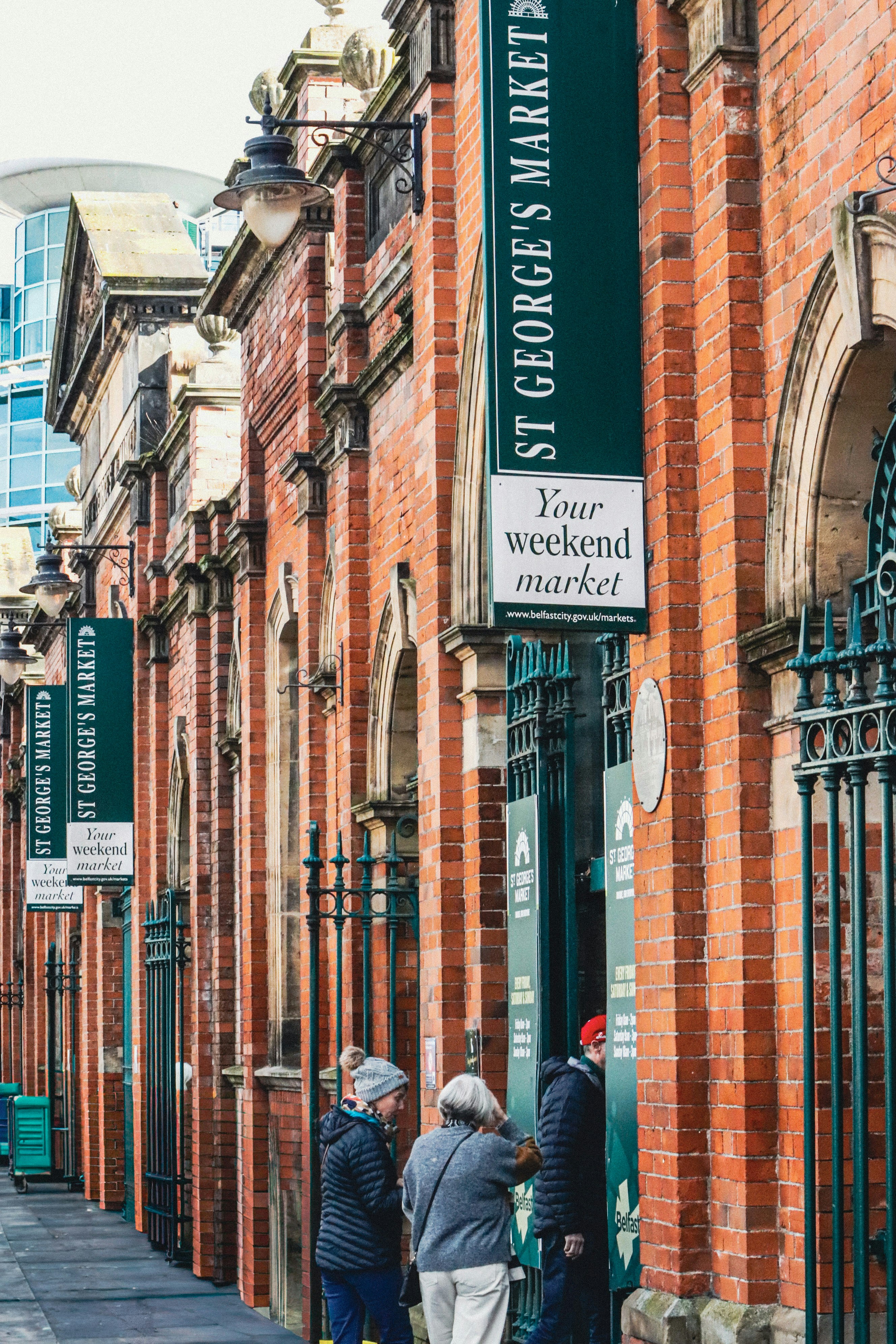 Brickwork and Bannered Arcades: Weekend Market Gateways