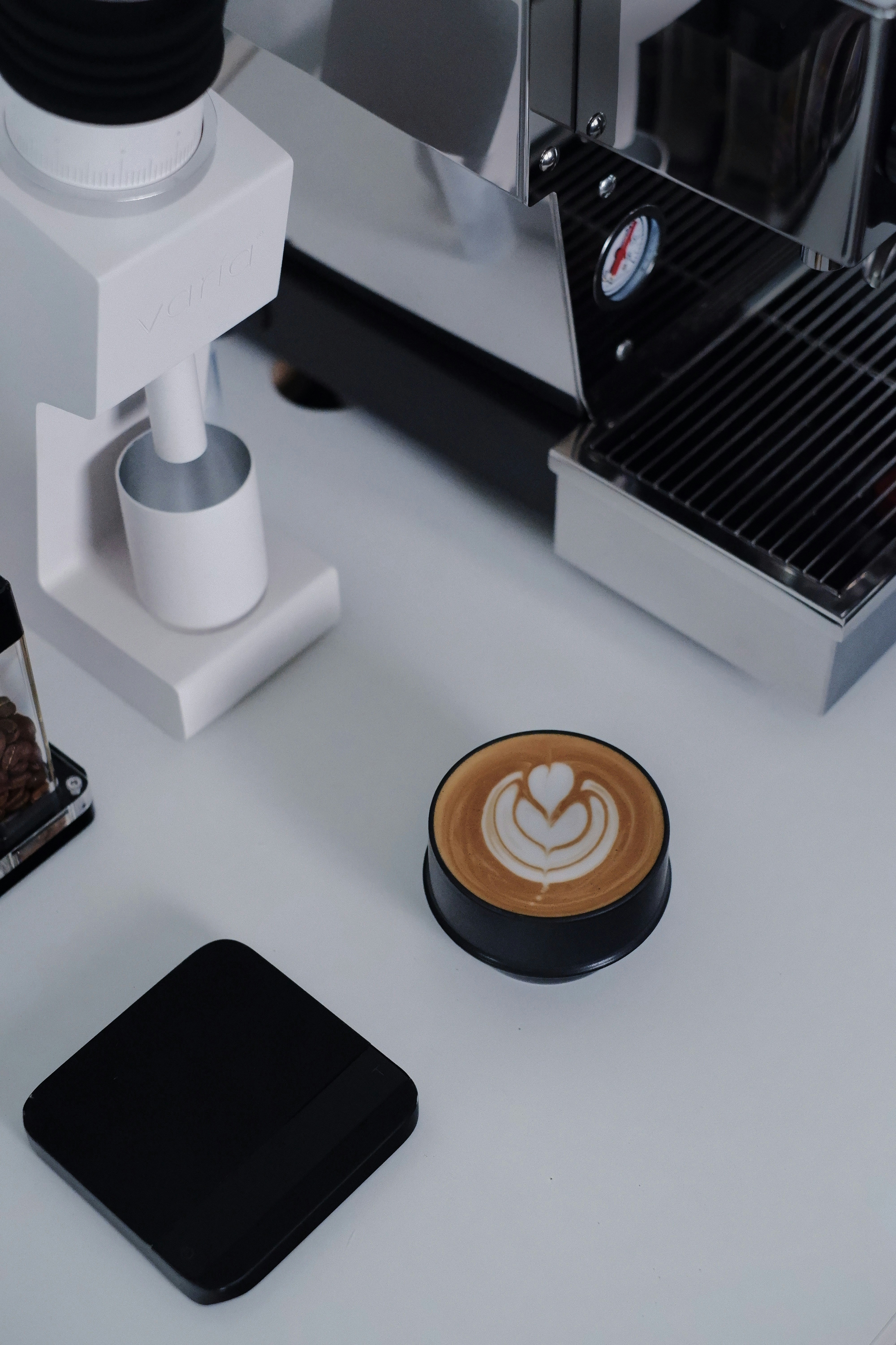 Latte Art in Minimal chrome: A Quiet Bar Scene