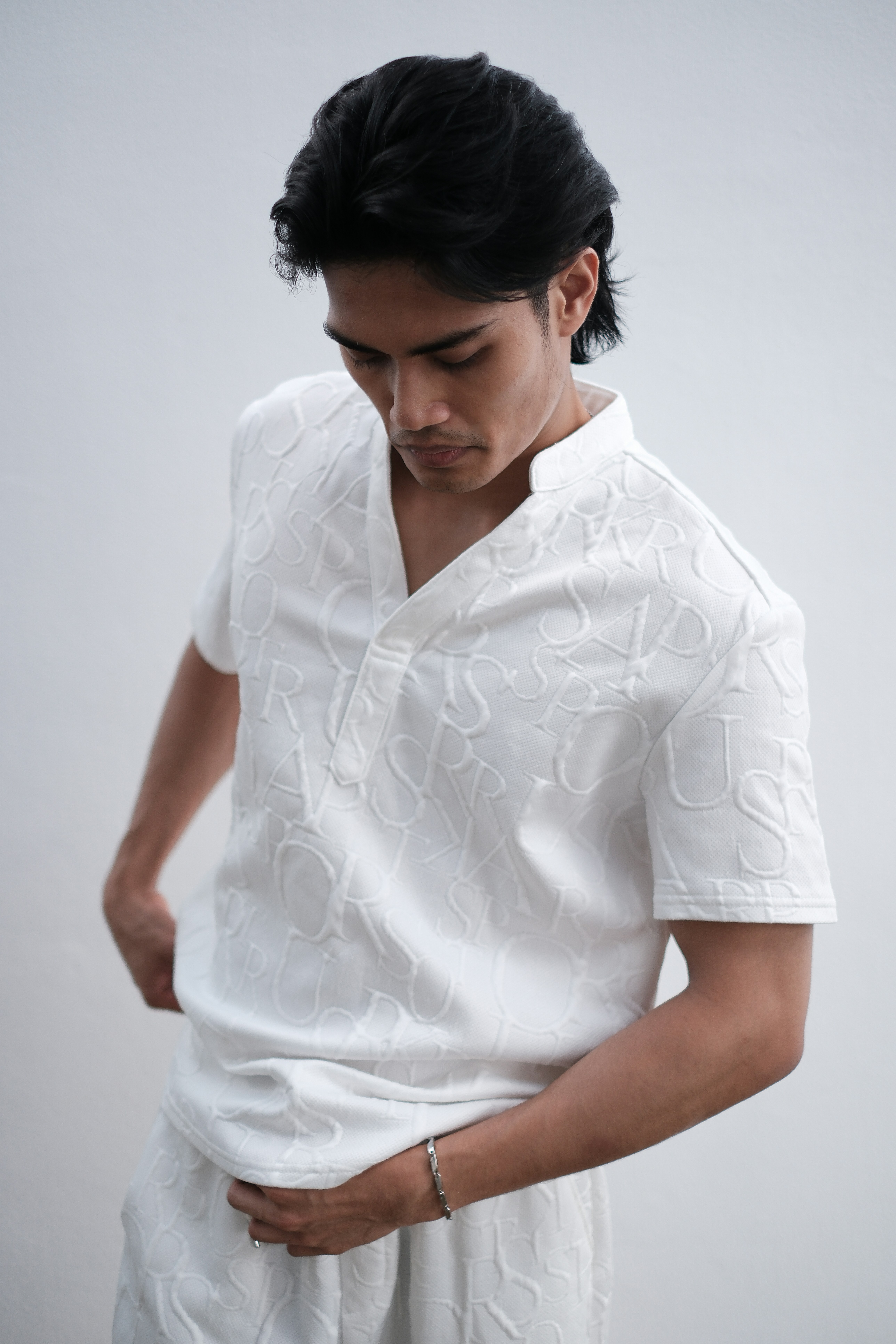 White Mosaic: A Poised Portrait in Soft Light