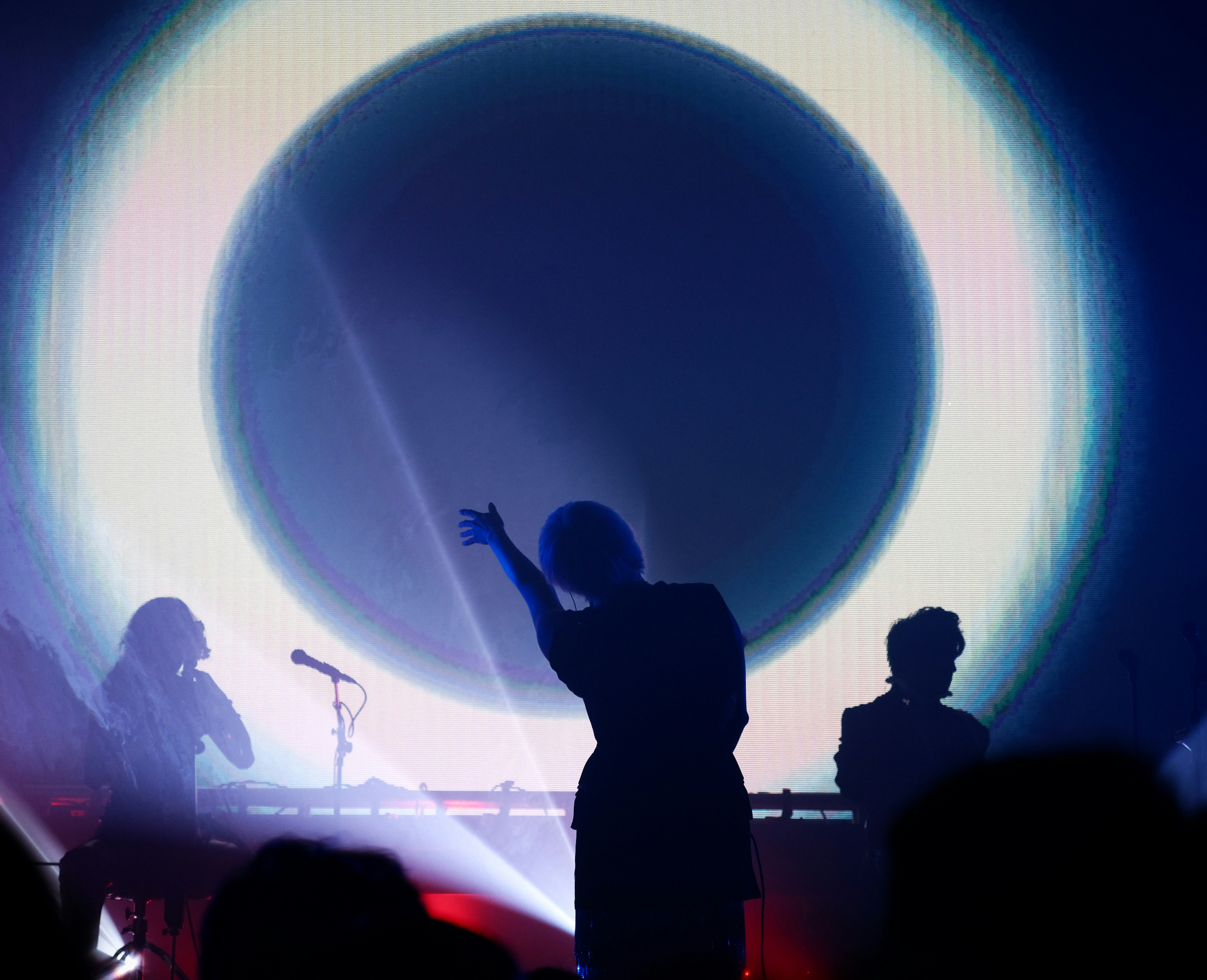 Into the Ring of Light: A Neon-Soaked Live Moment