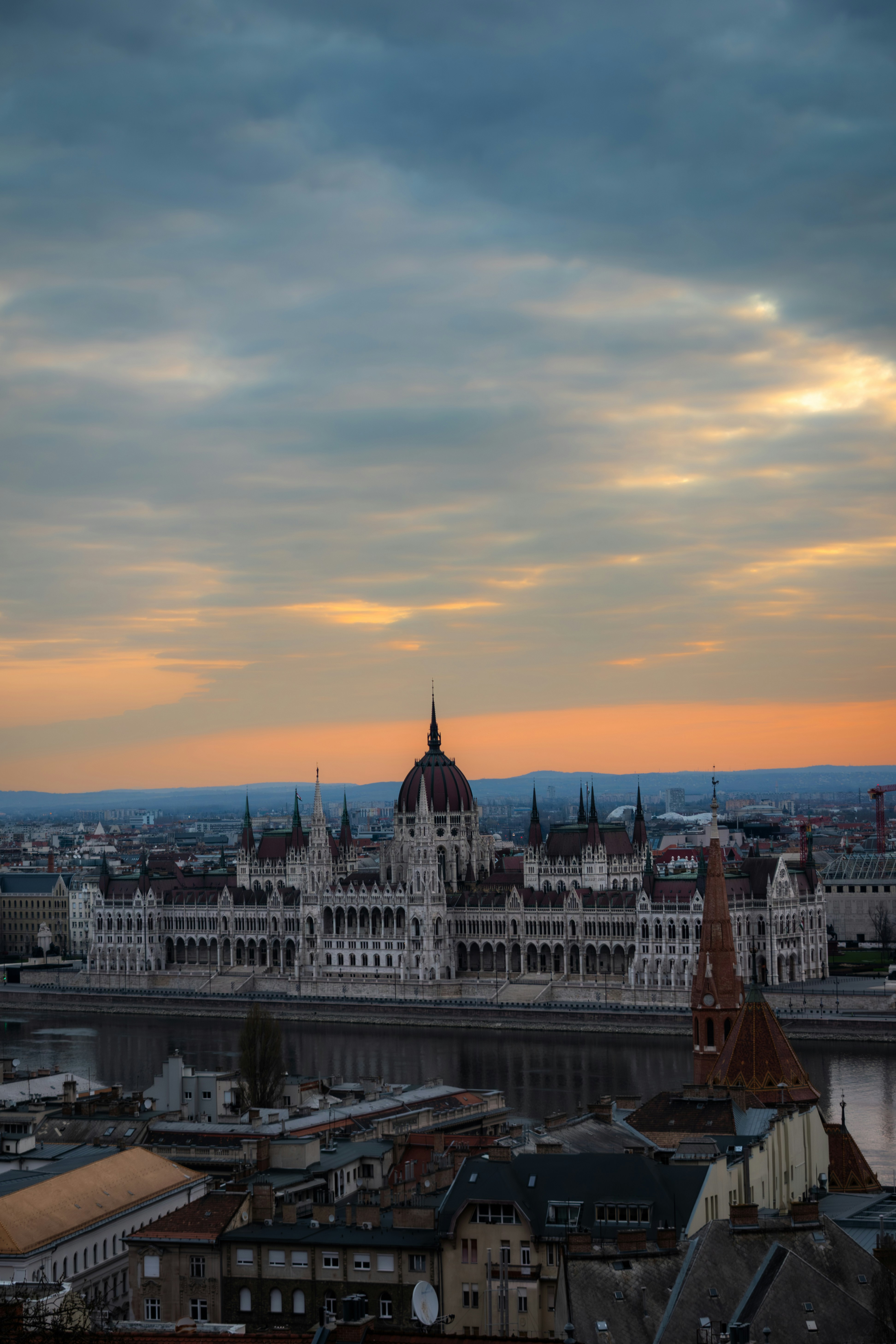 Golden Hour Over the Parliament: Evening Silhouette of Budapest