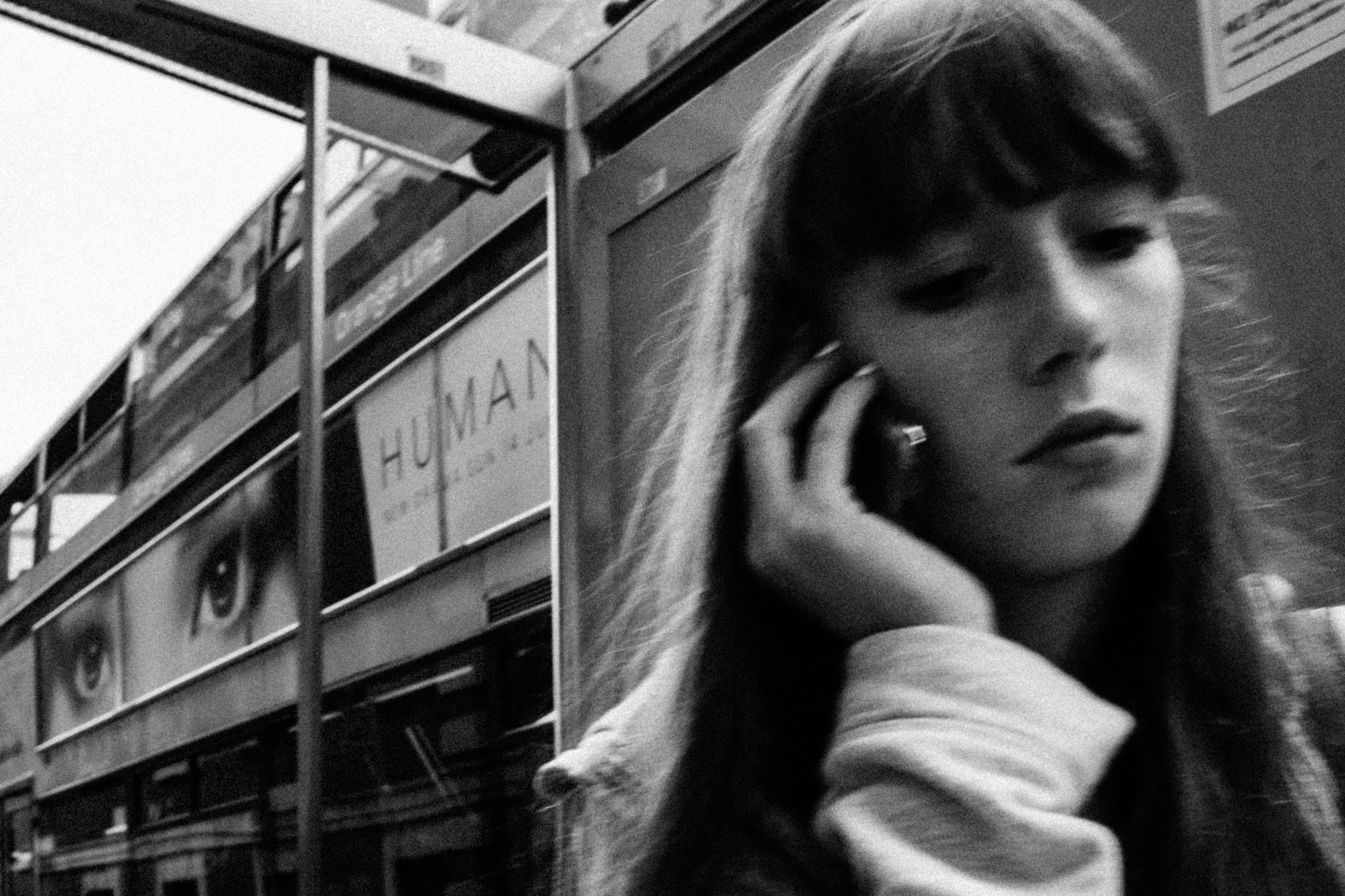 Midday Silence on the Subway: A Girl with a Quiet Phone