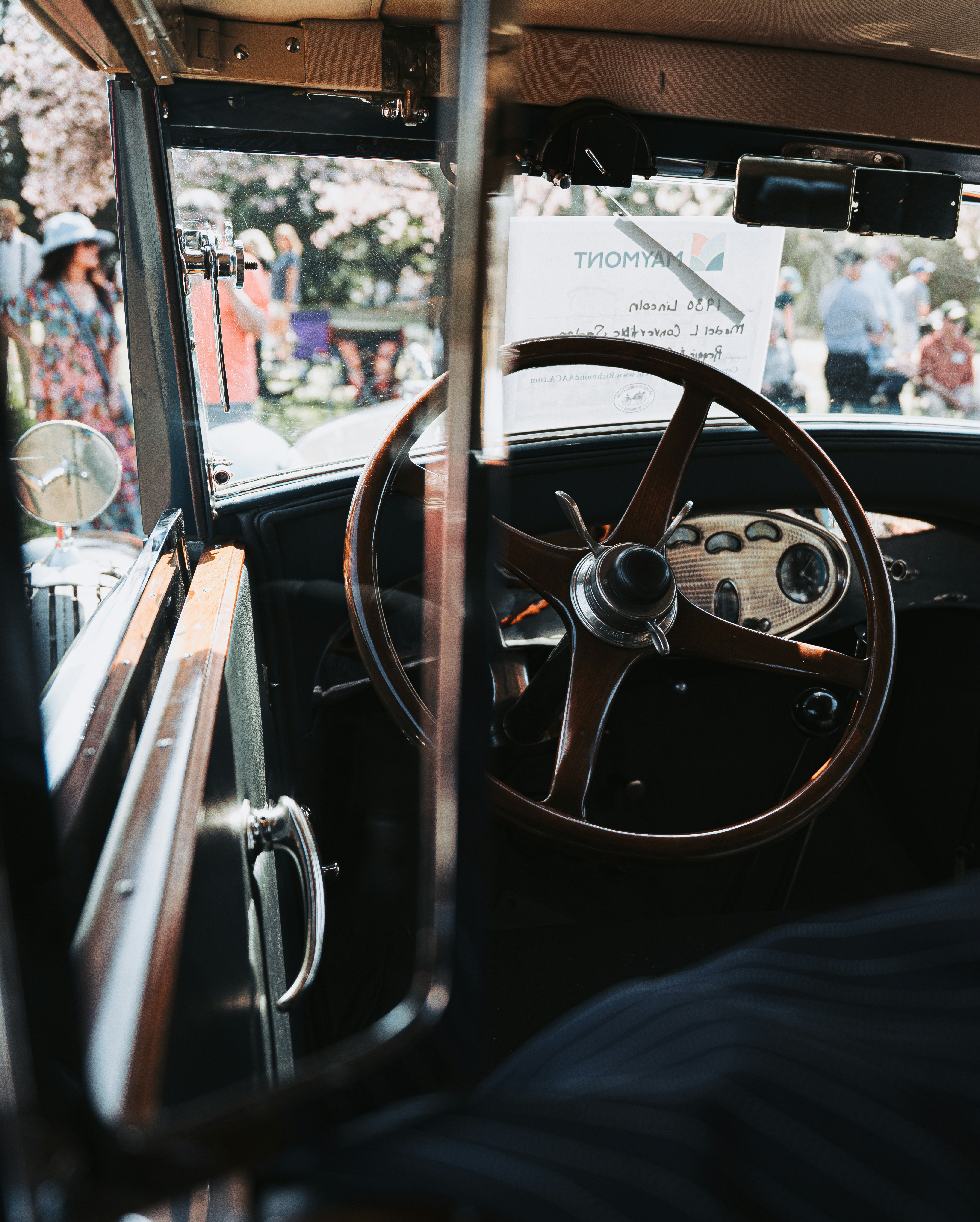 The Vintage Car's Wooden Steering Wheel: Gaze Through Time