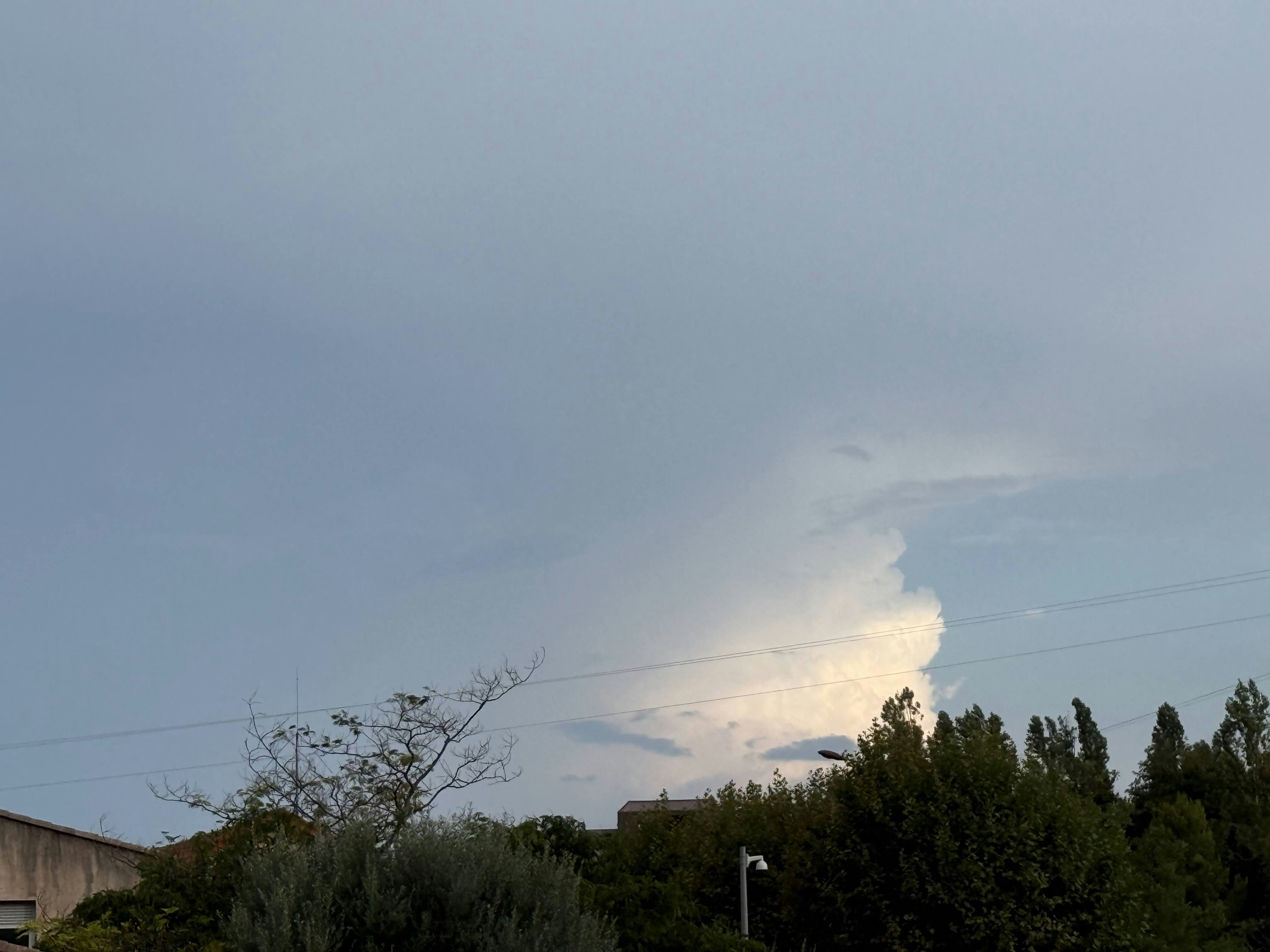 Cloud-Soft Horizon Over Quiet Suburb