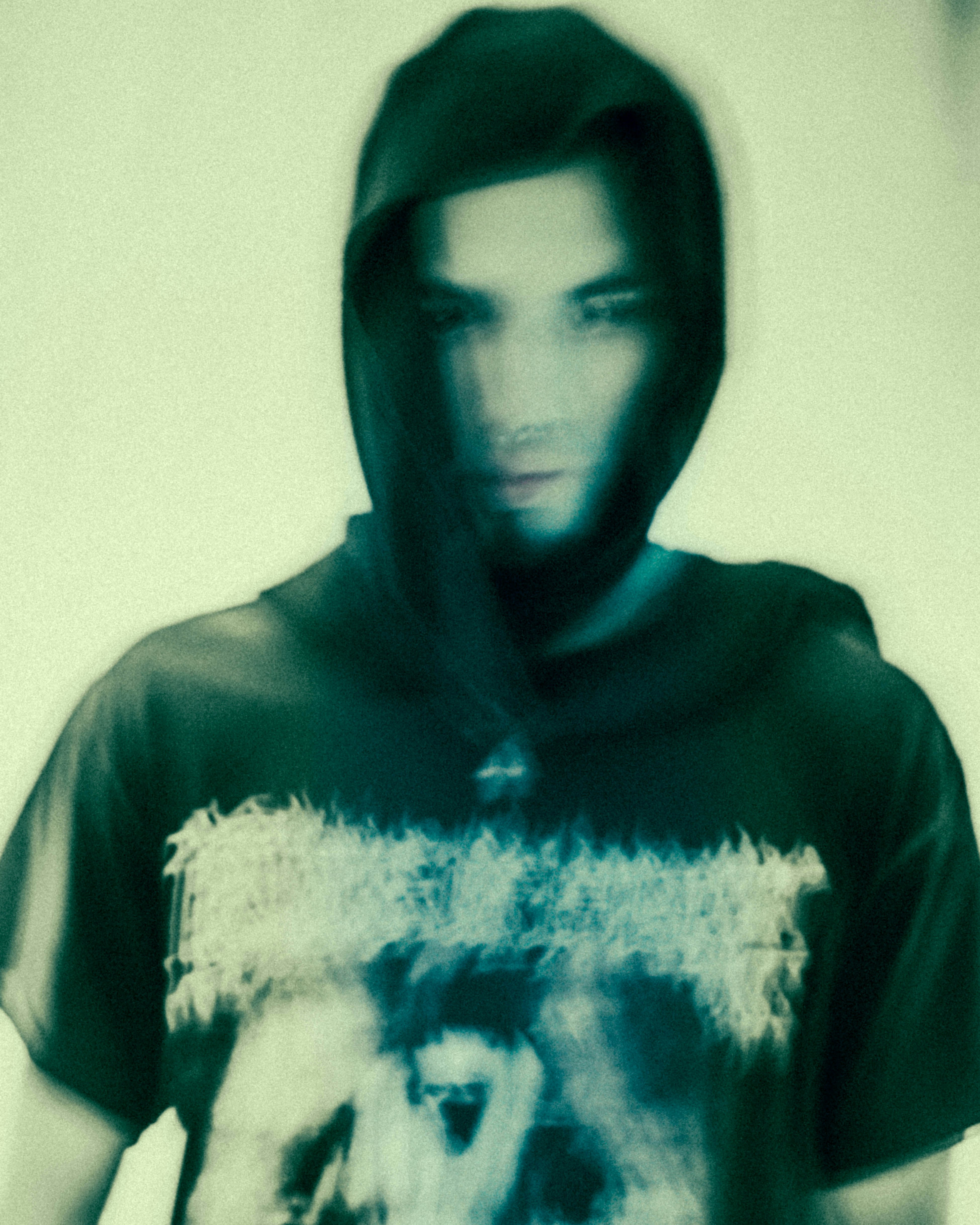 Blurred Hoodie Portrait in Neon Hue