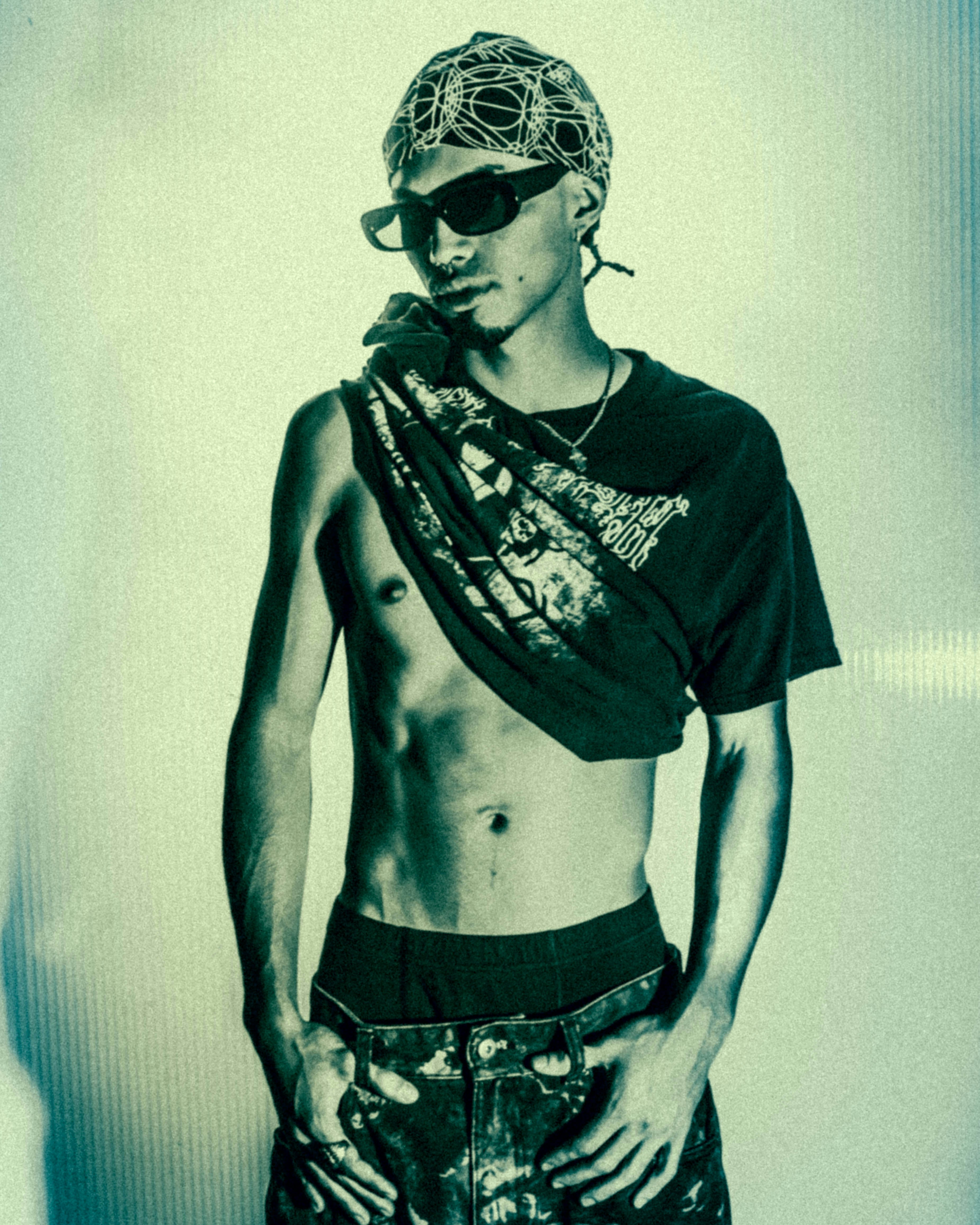 Shadowed Attitude: A Gritty Portrait in Neon Tonal Grain