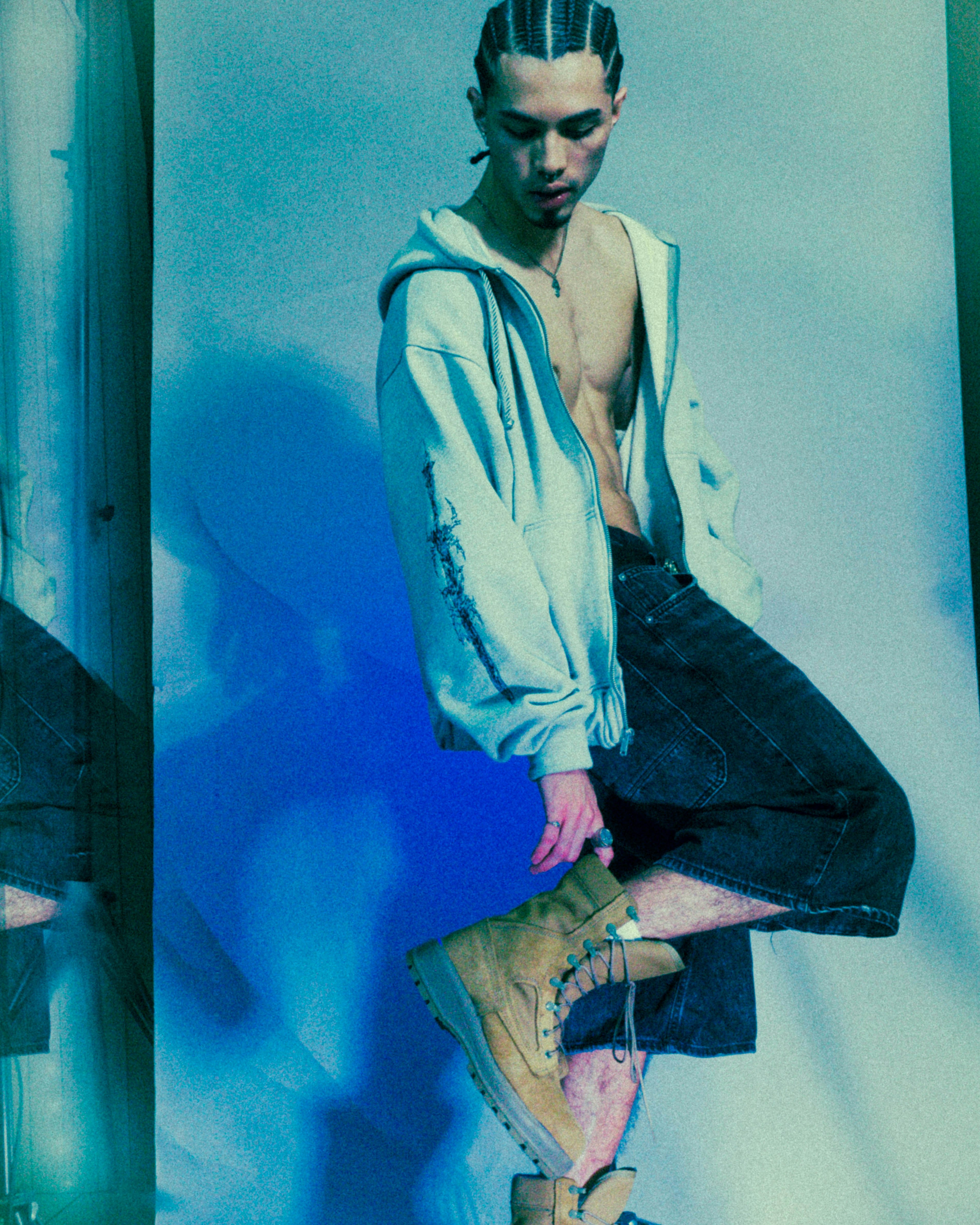 Midair Quiet: A Neon-Blue Portrait in Motion