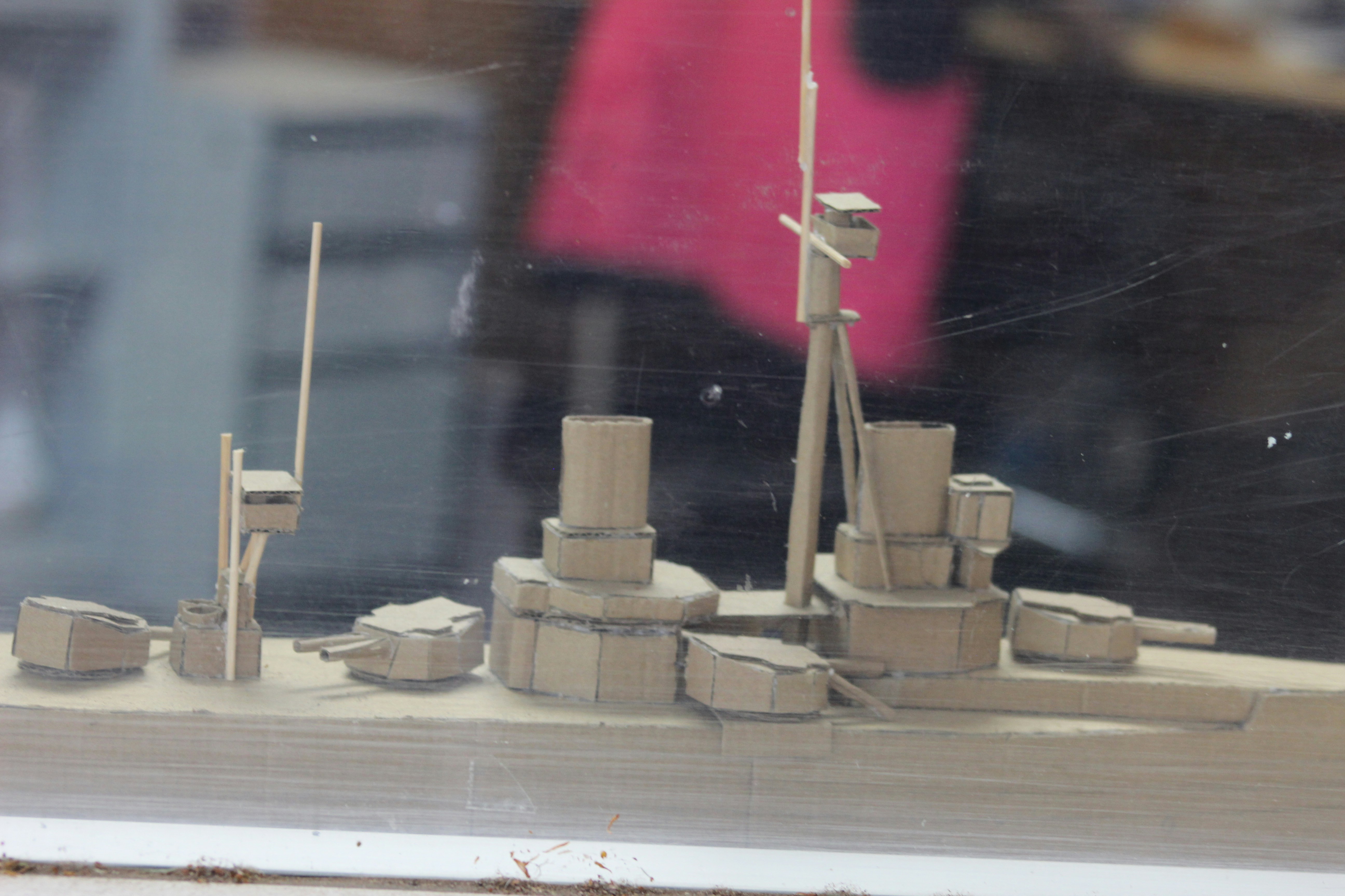 Miniature Naval Fleet on a Window Sill