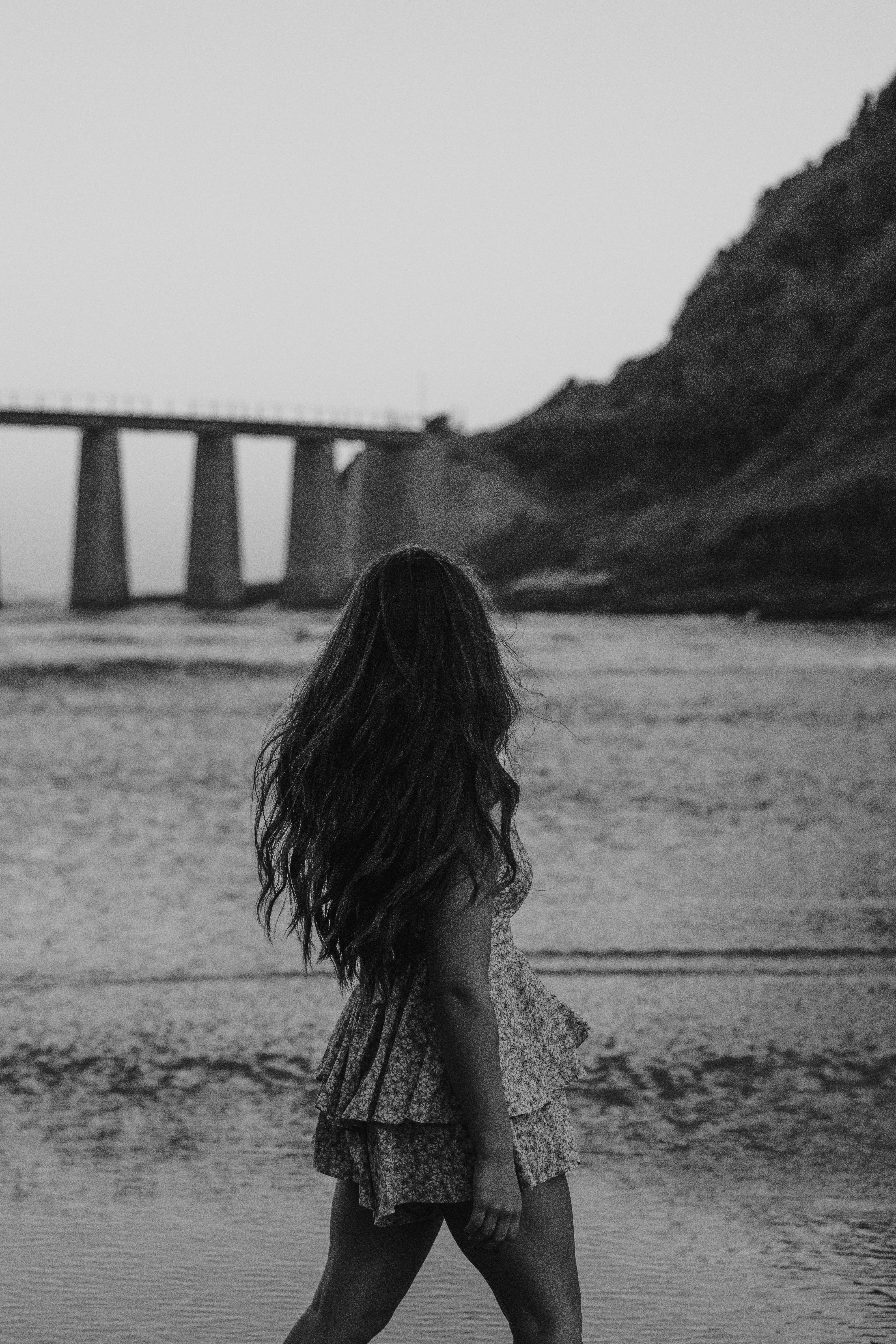 Whispers of the Sea: A Figure in the Shoreline Silhouette