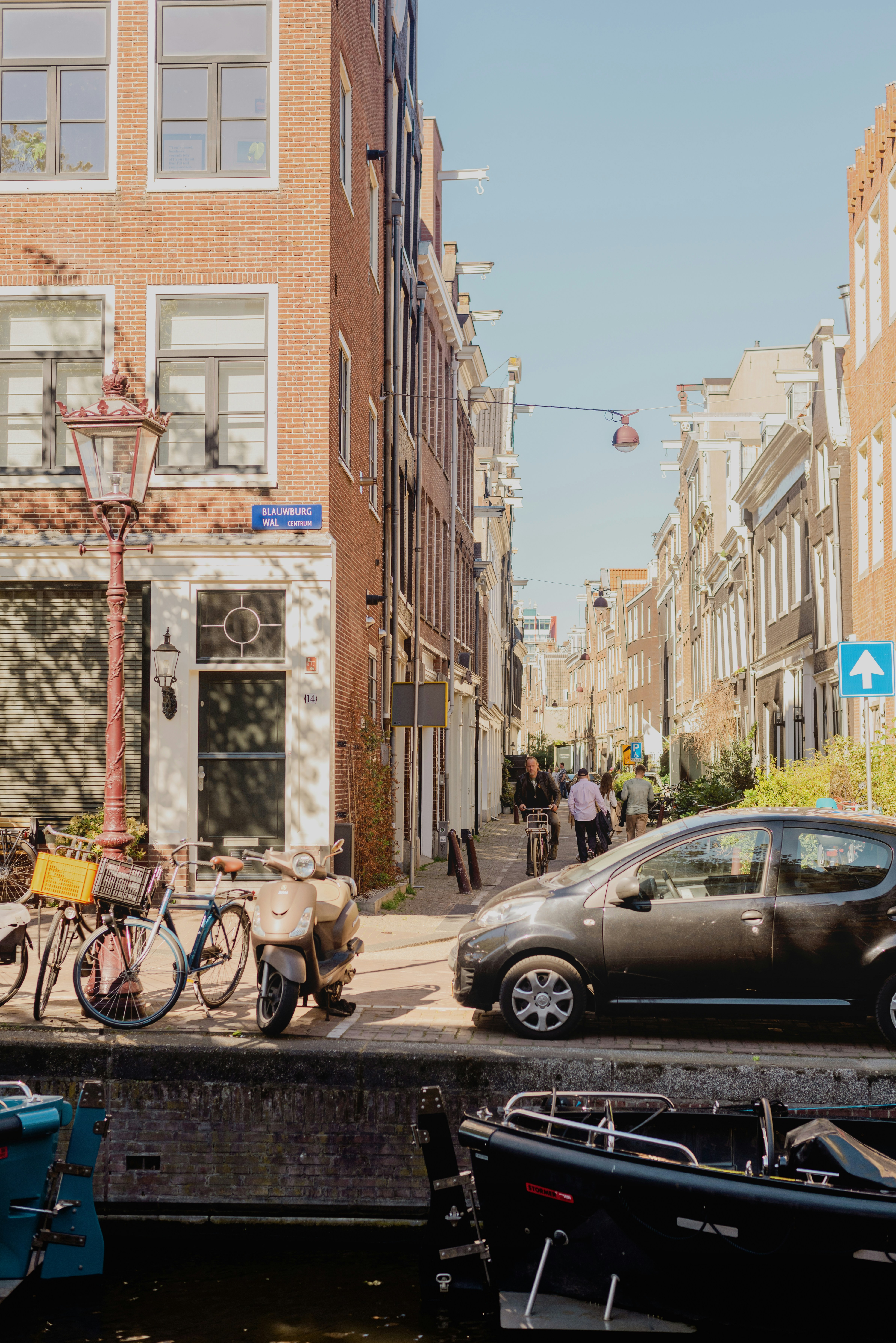 Canalside Street Scene with Bicycles and Front-Row Urban Life