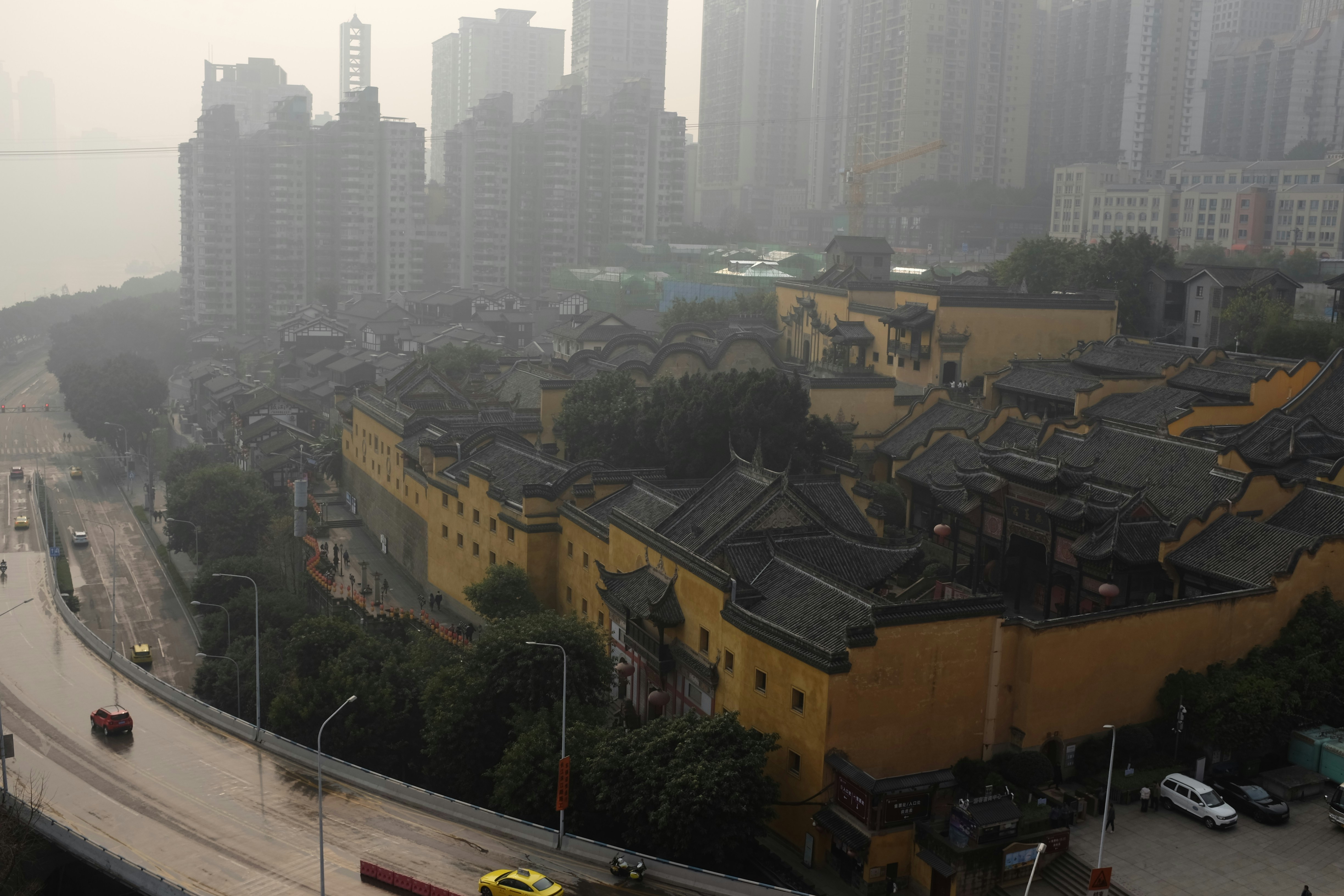 Muted Dawn Over Historic Walls and Modern Towers