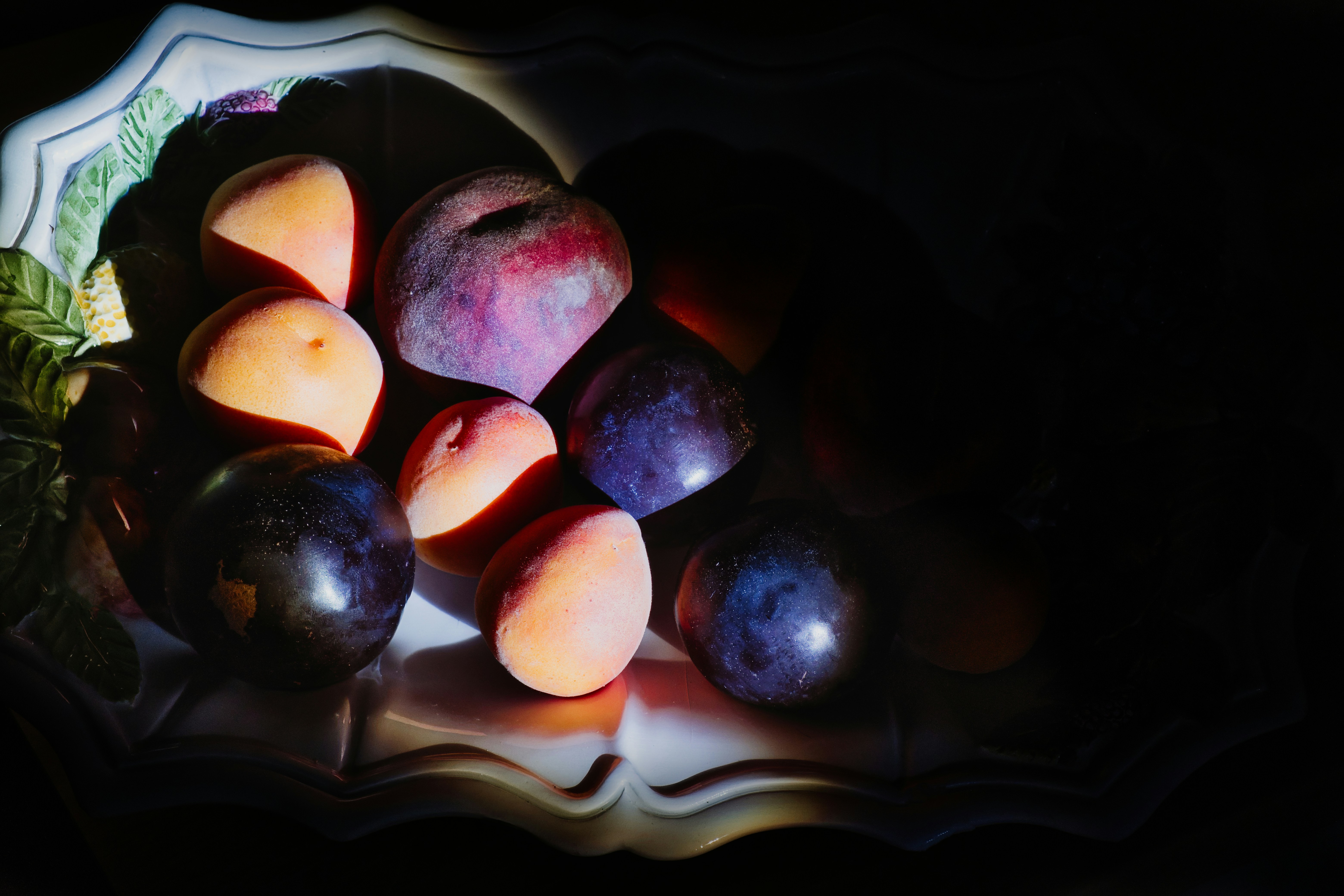 Fruit in a Shaded Bowl: Hidden Colors in a Velvet Dark