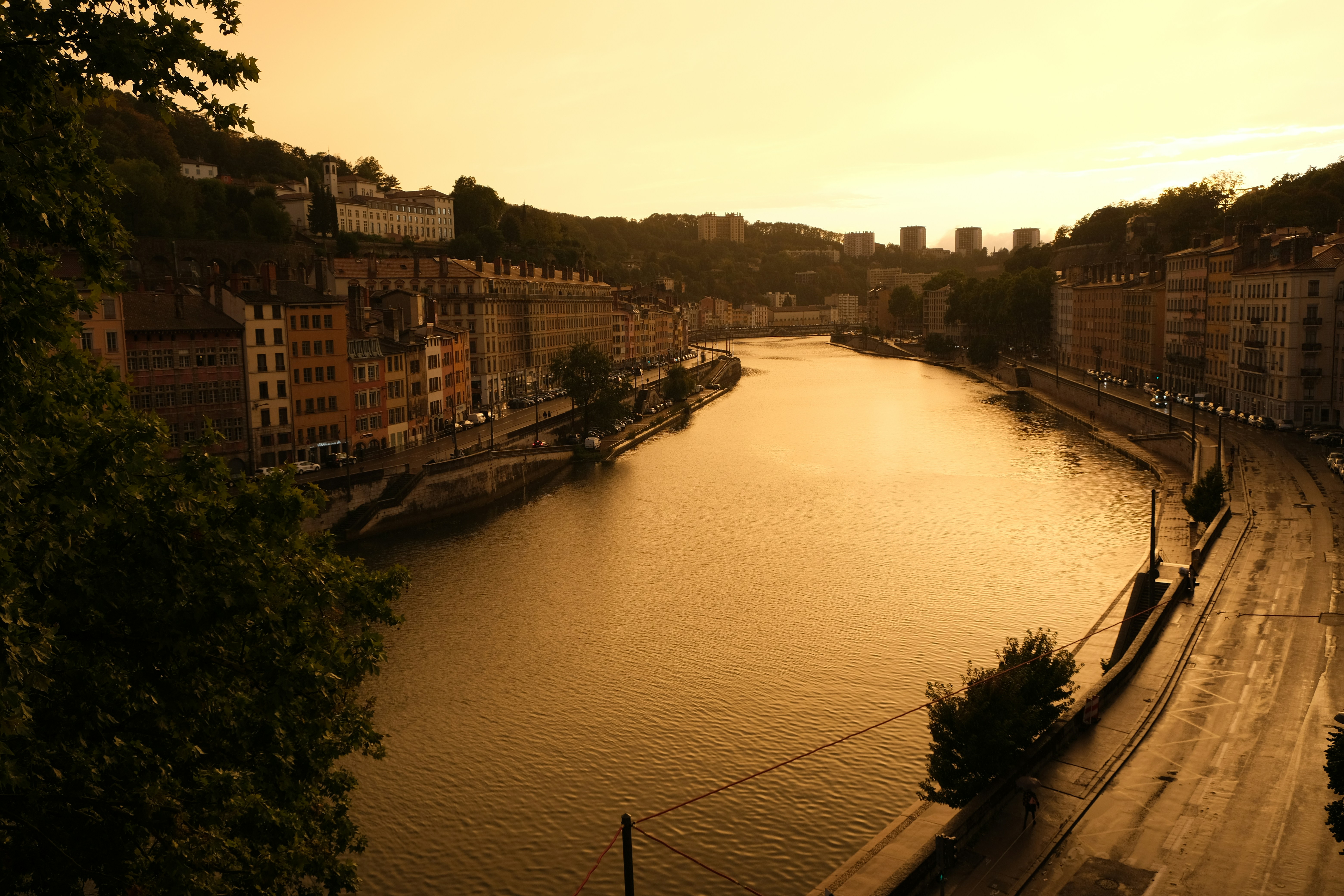 Sunset Over the Riverwalk: A Golden Hour Perspective