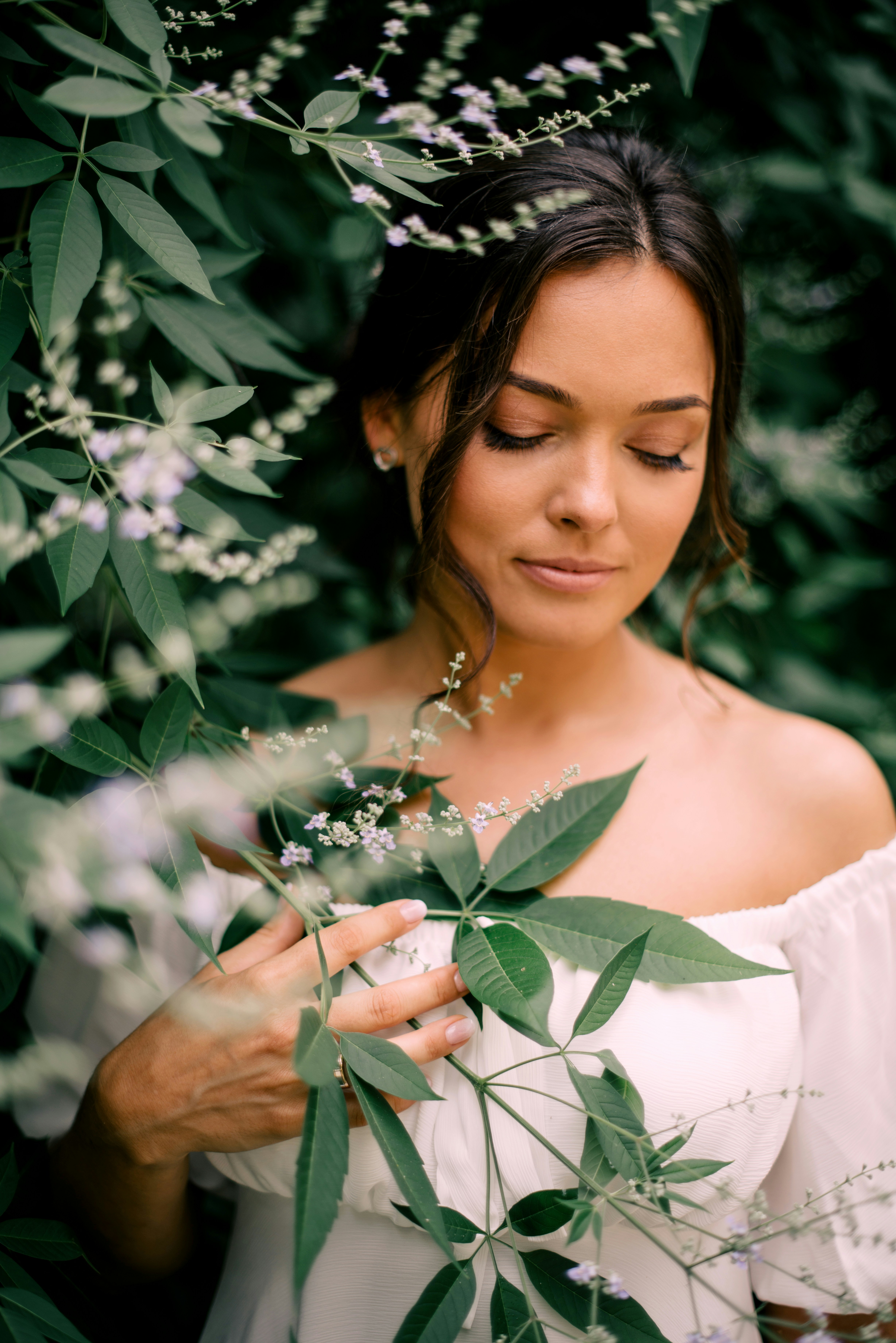 Whispers in the Leaves: a Quiet Portrait Among Blossoms