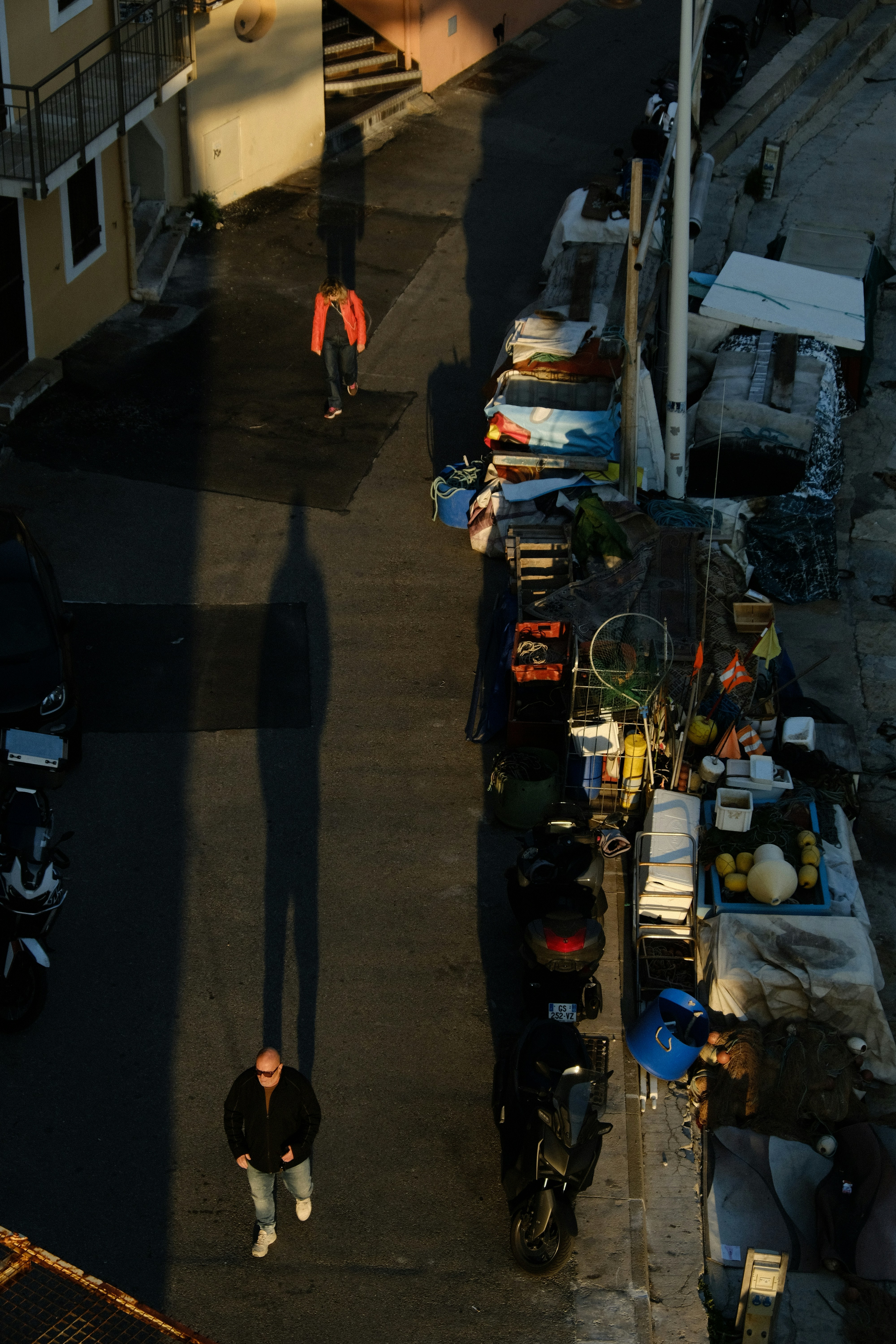 Dusk Alley: A Quiet Walk Past a Market's Stacks