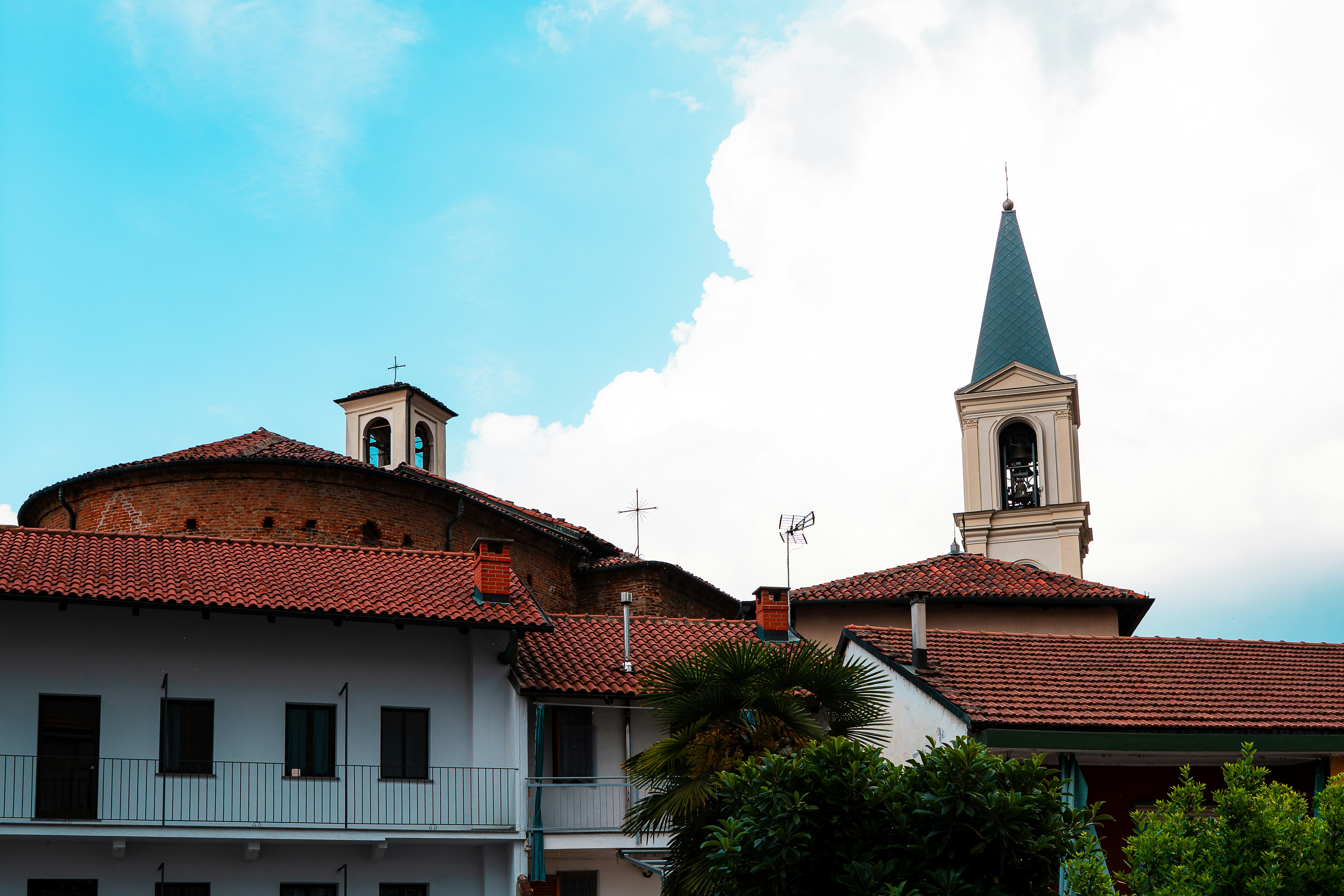 Terracotta Rooflines and Twin Turrets Under a Bright Sky