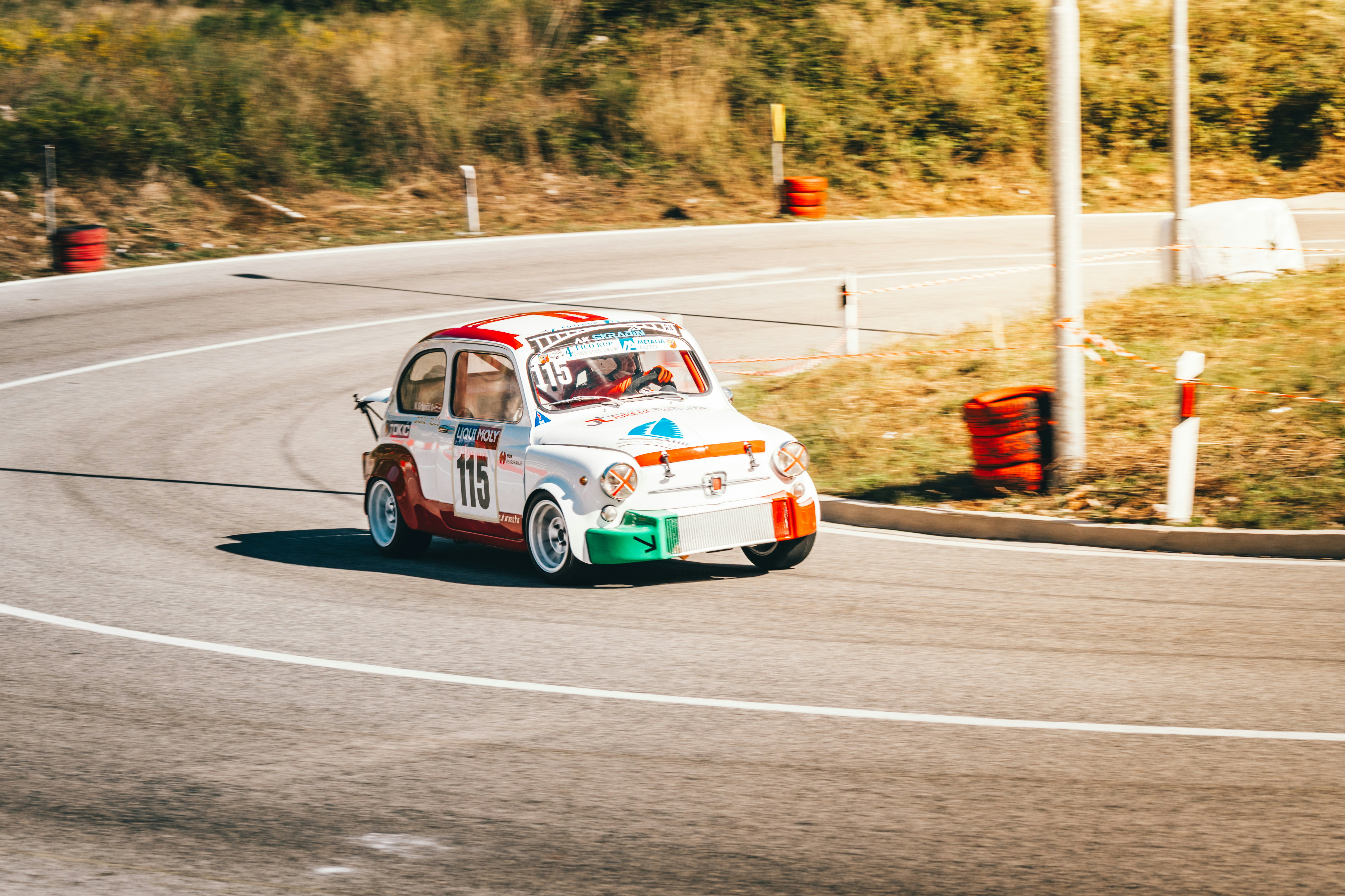 Tiny Classic Racer Tackles a Winding Mountain Road