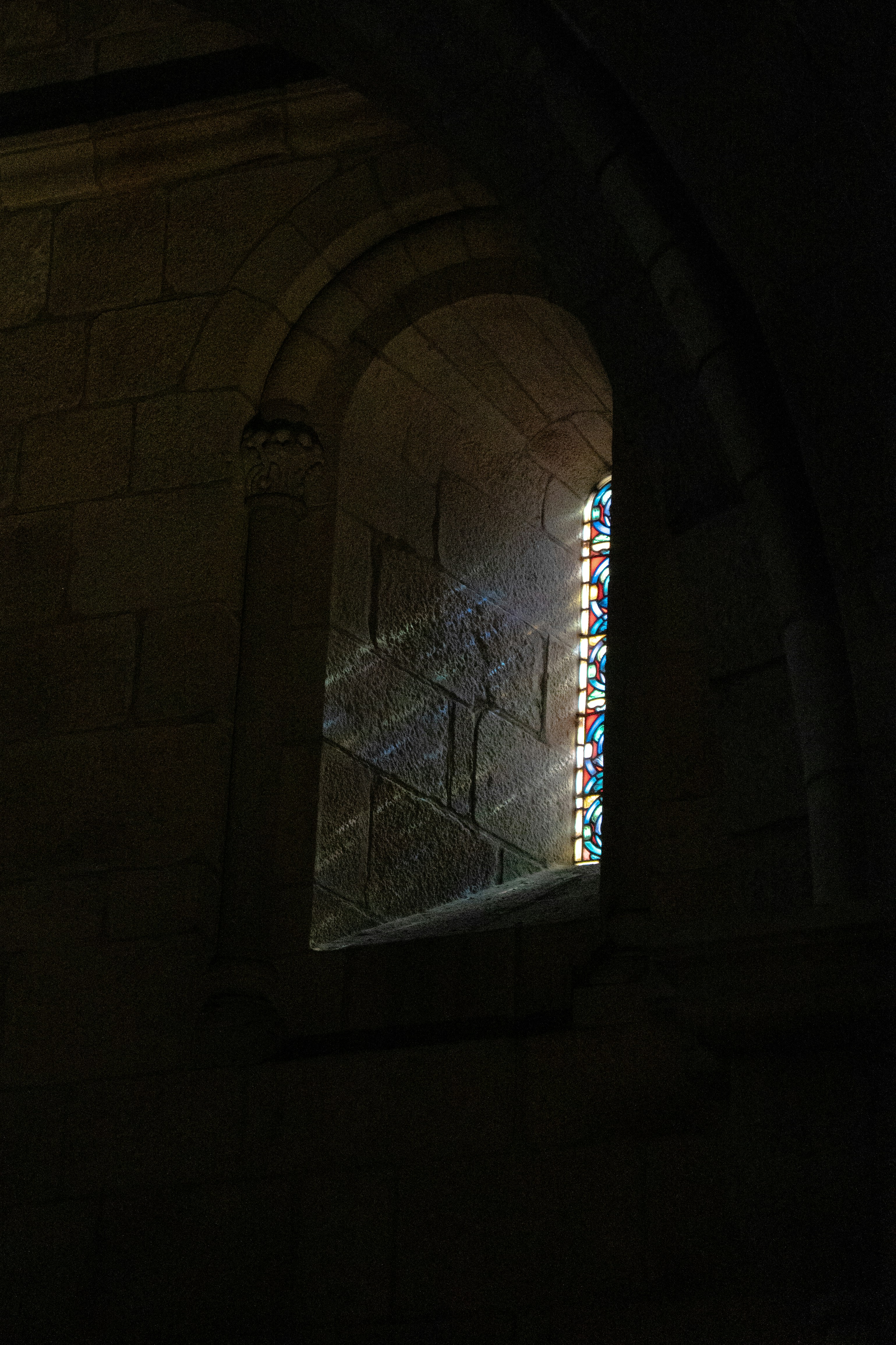 Stained Light in a Stone Archway