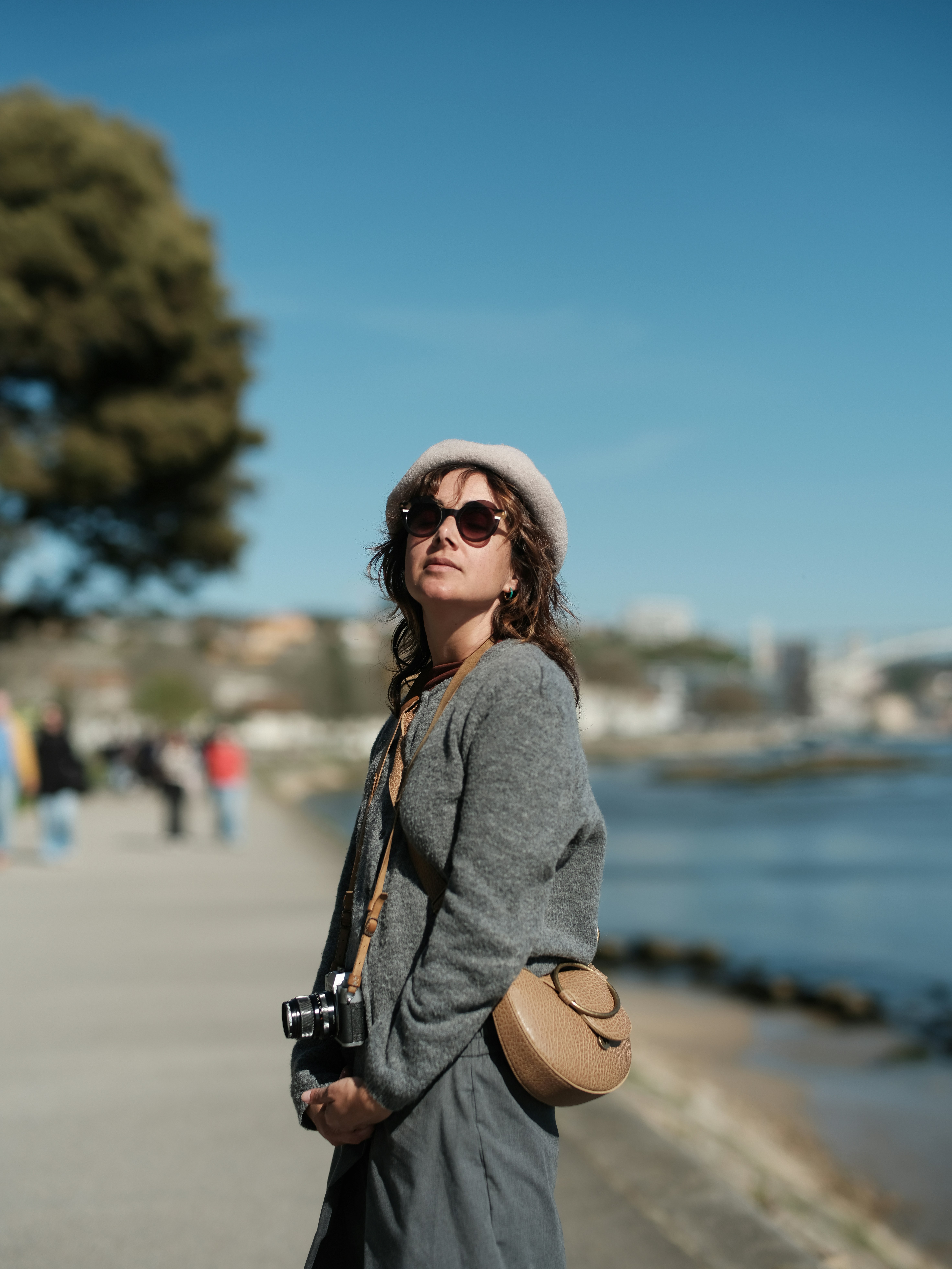 Portrait on the Seafront: A Quiet Moment in the Open Air