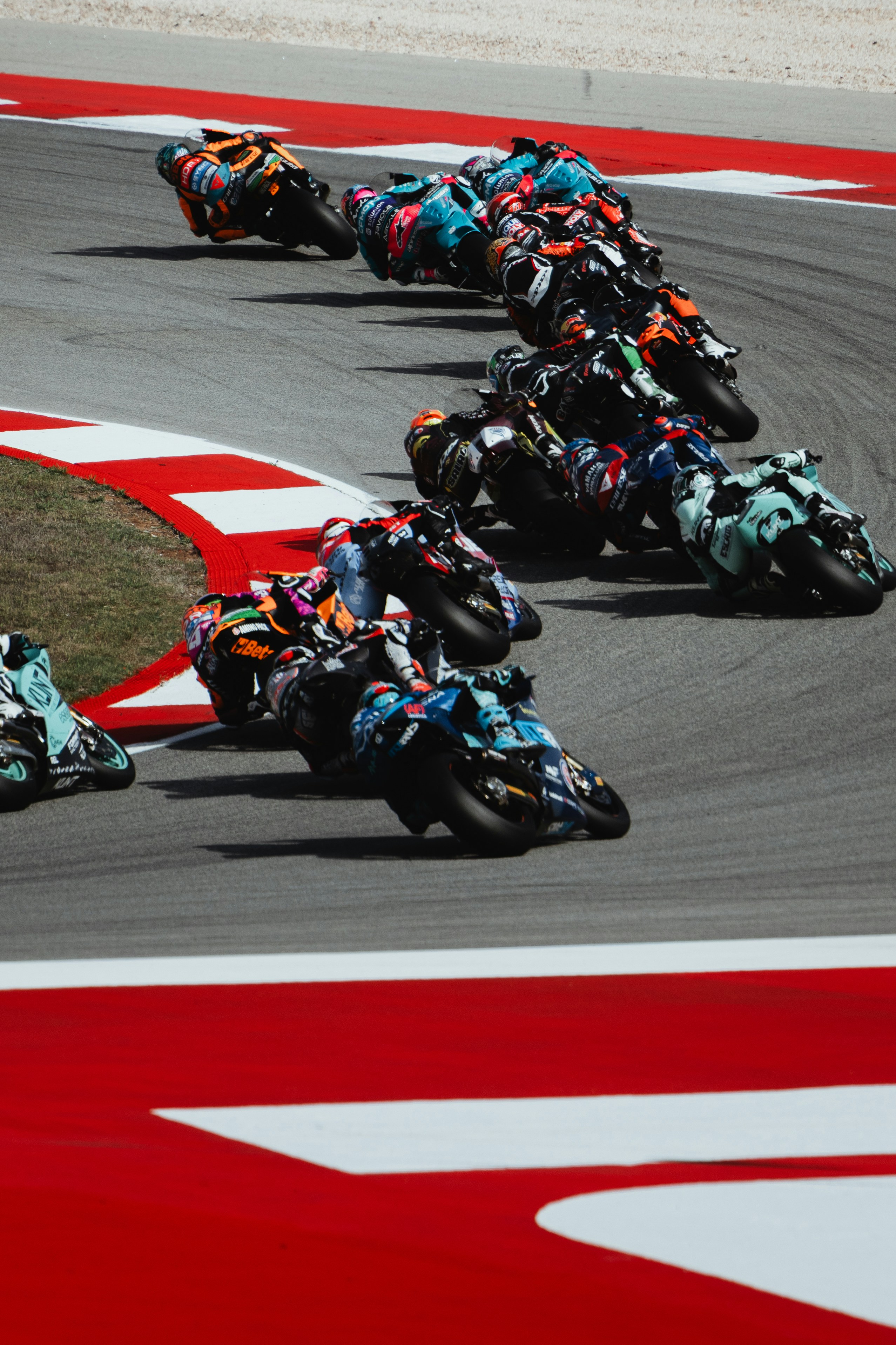 Chorus of Rockets: A Curved Line of MotoGP Paint and Precision