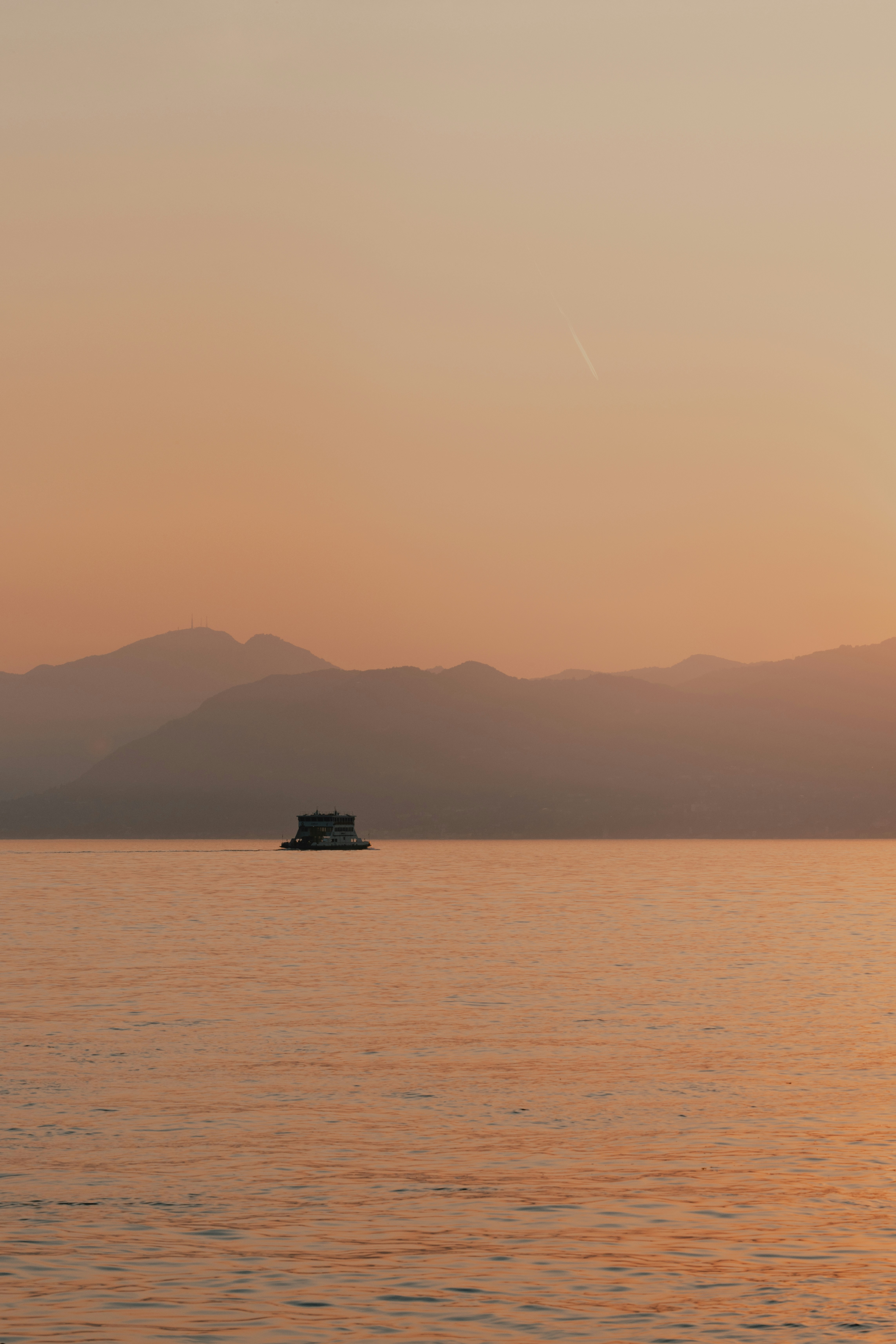 The Dawn Ferry Across a Quiet Sea