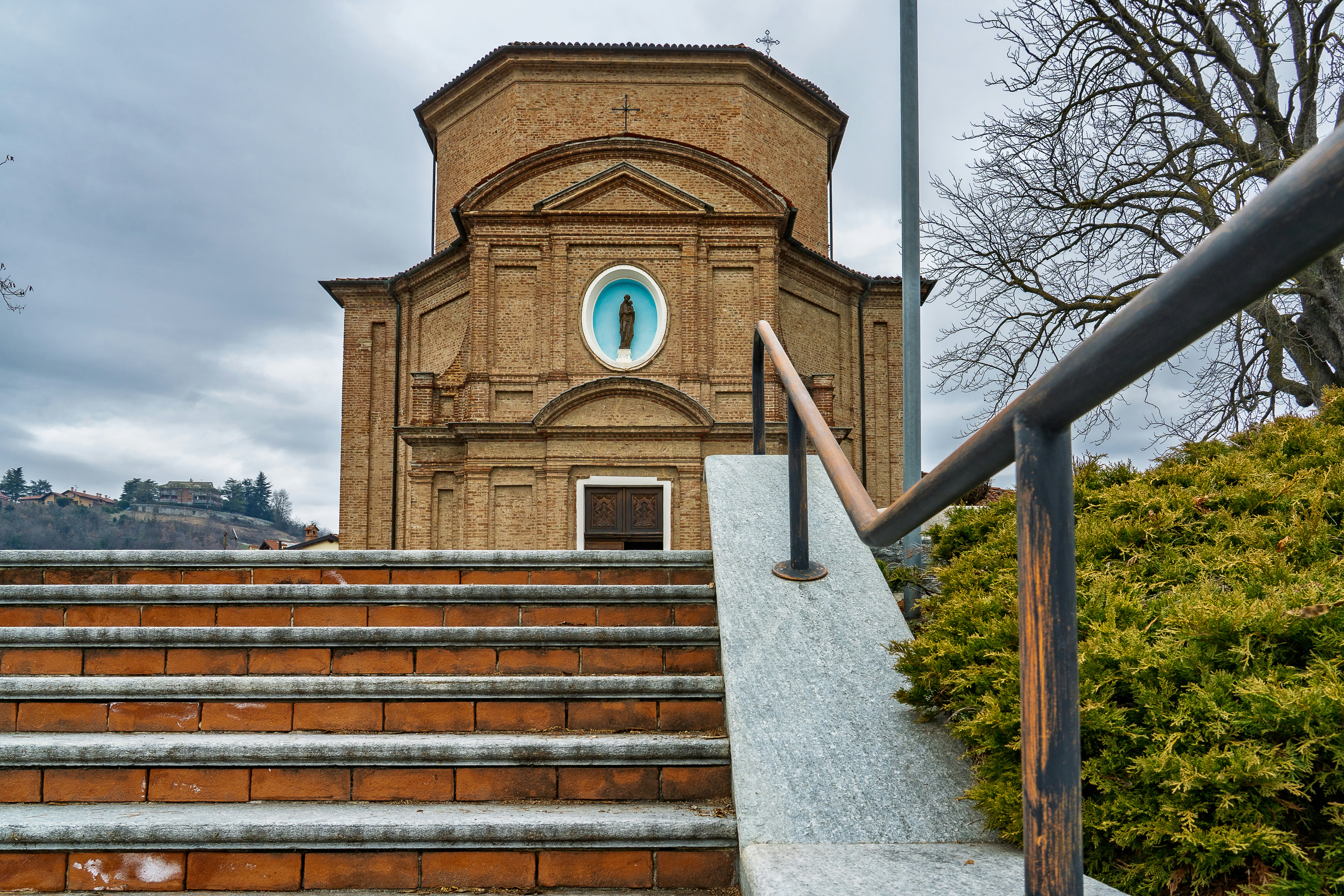Brick Church at the Top of Weathered Steps