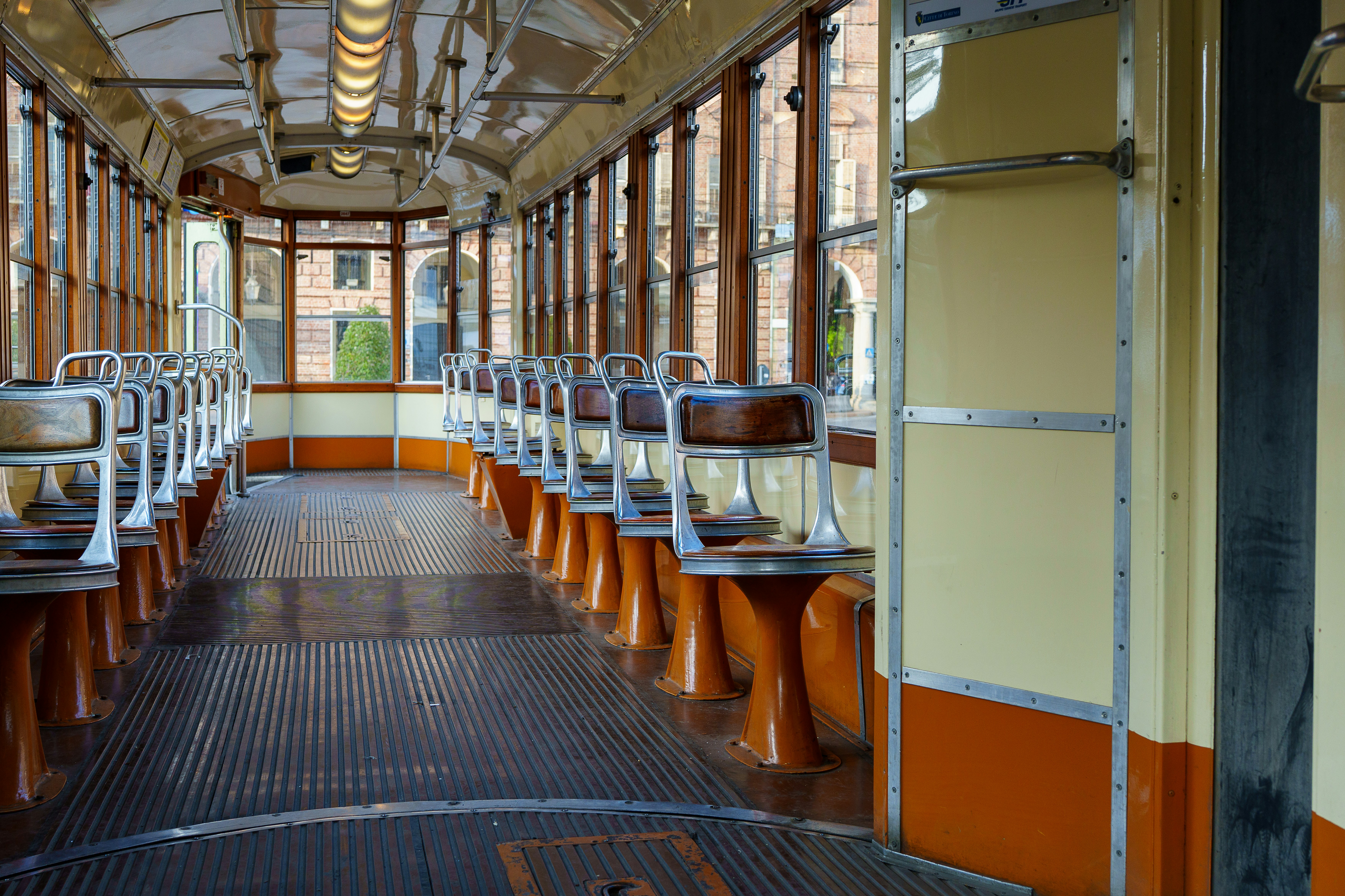 Row of Empty Bus Seats: A Quiet Evening Inside a Vintage Transit Car