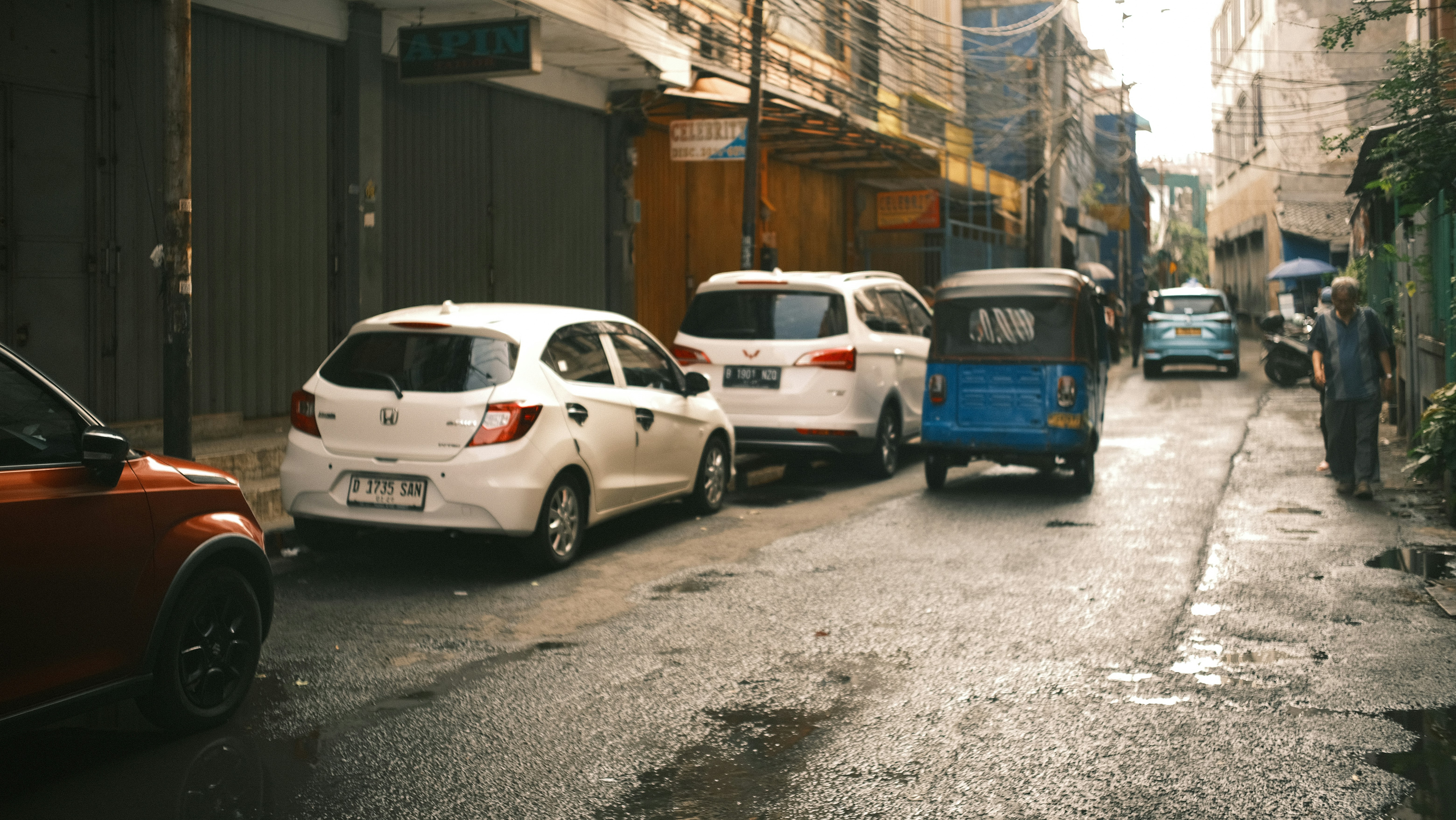 Midday Traffic on a Narrow Urban Street