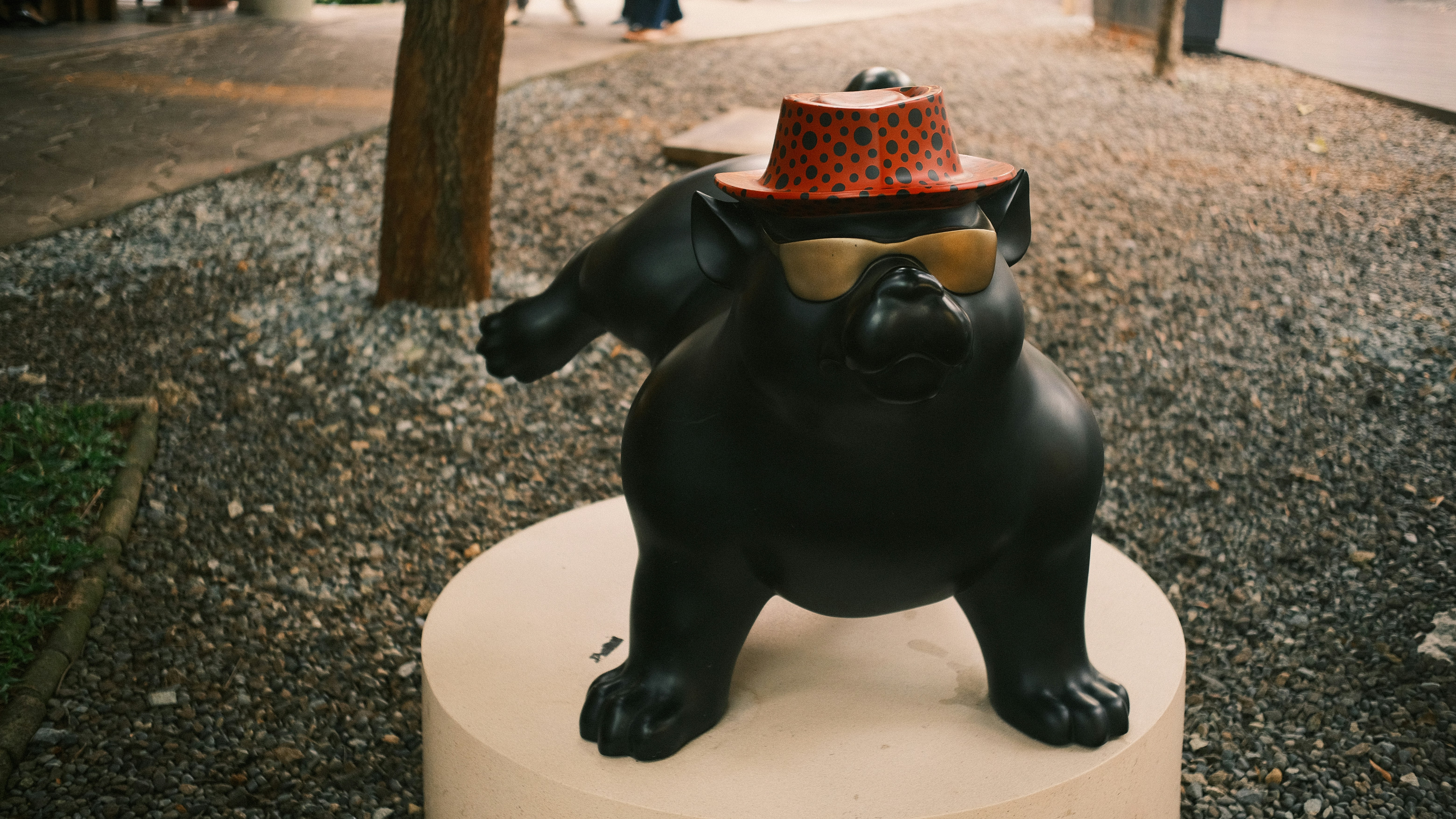 The Hatsud Bulldog: A Dapper Sentinel in a Park