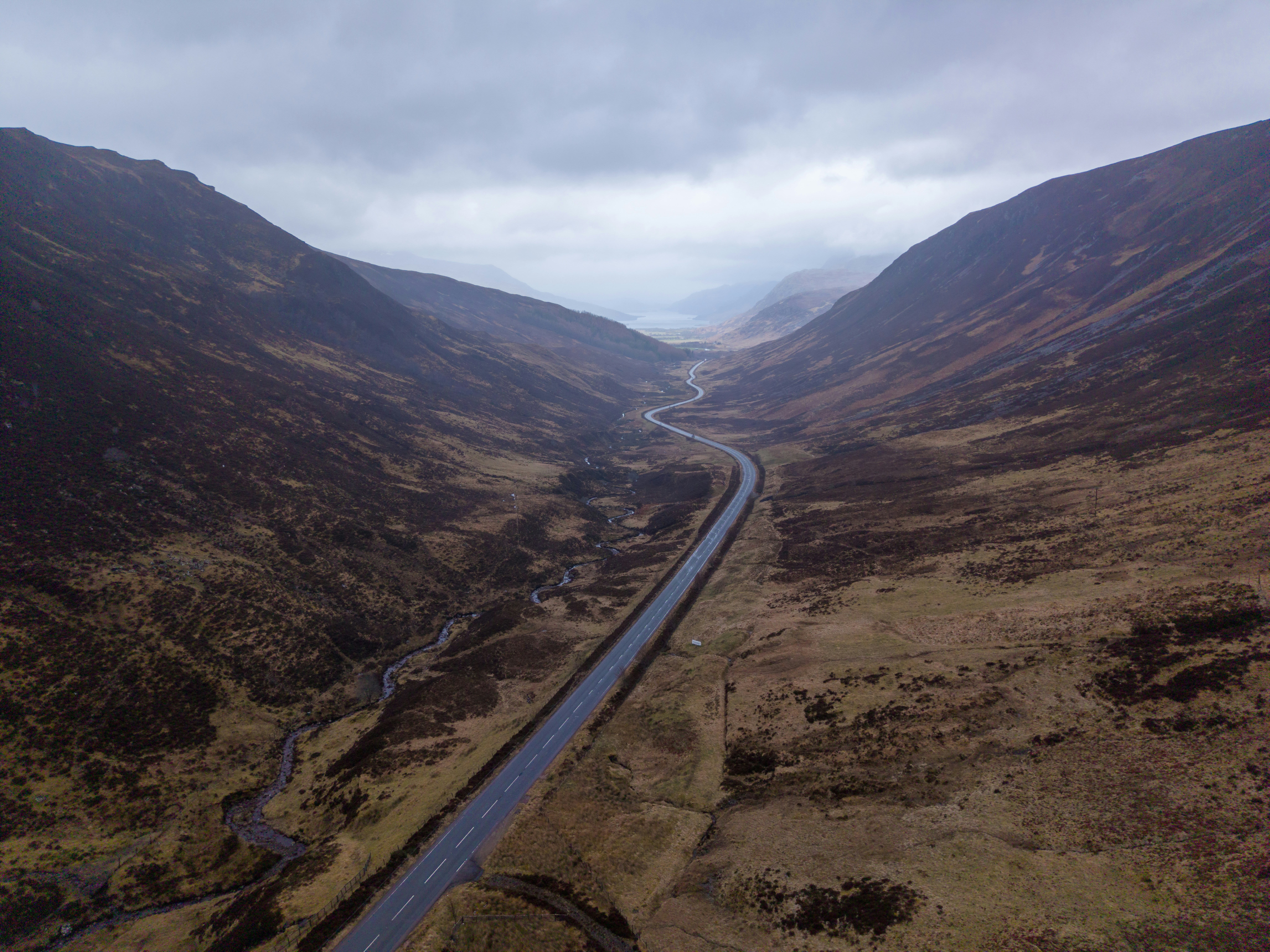 Vast Valley Road: A Meandering Highway Through Moody Highlands