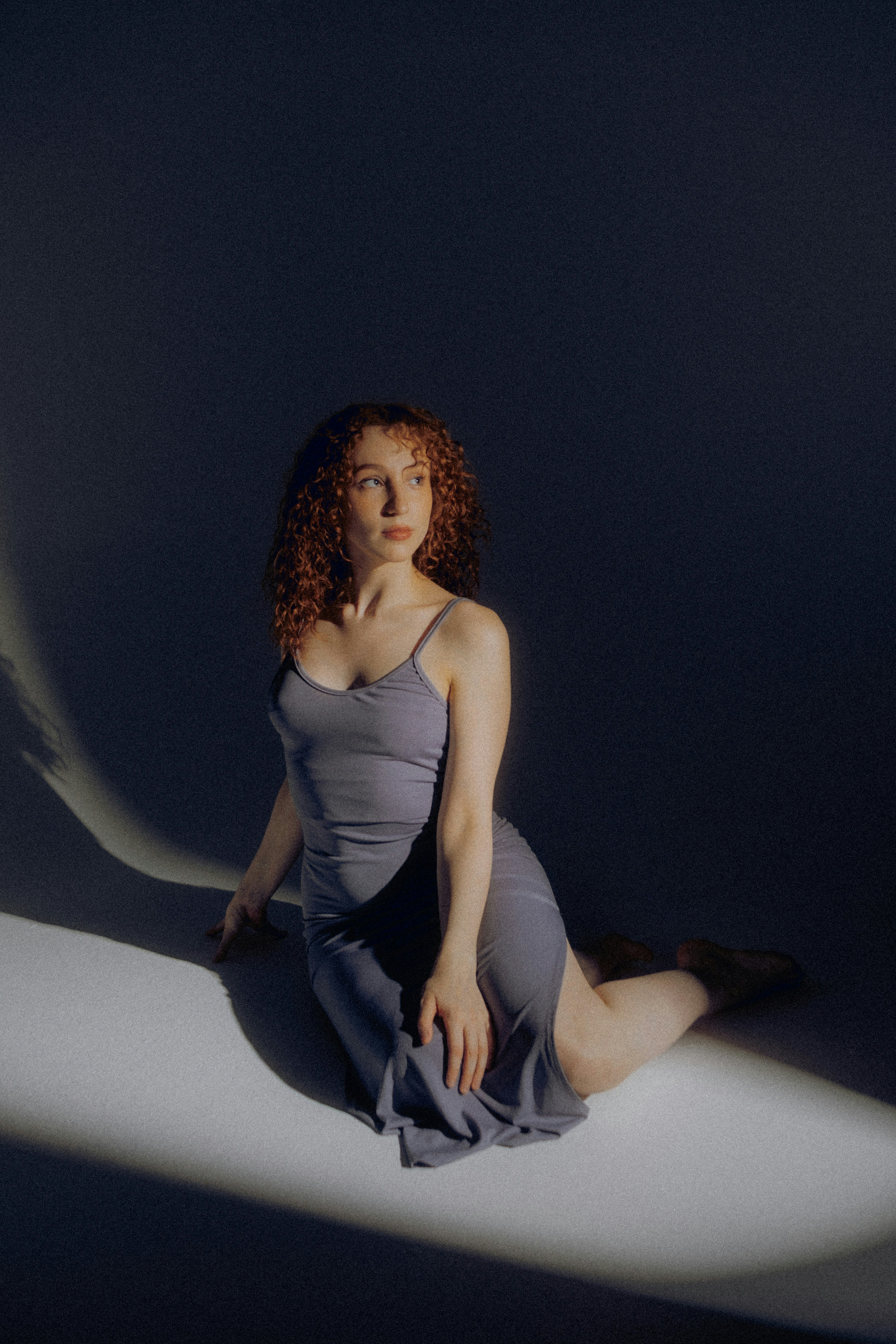 Liquid Nightlight: Red-haired Poise in Minimal Studio