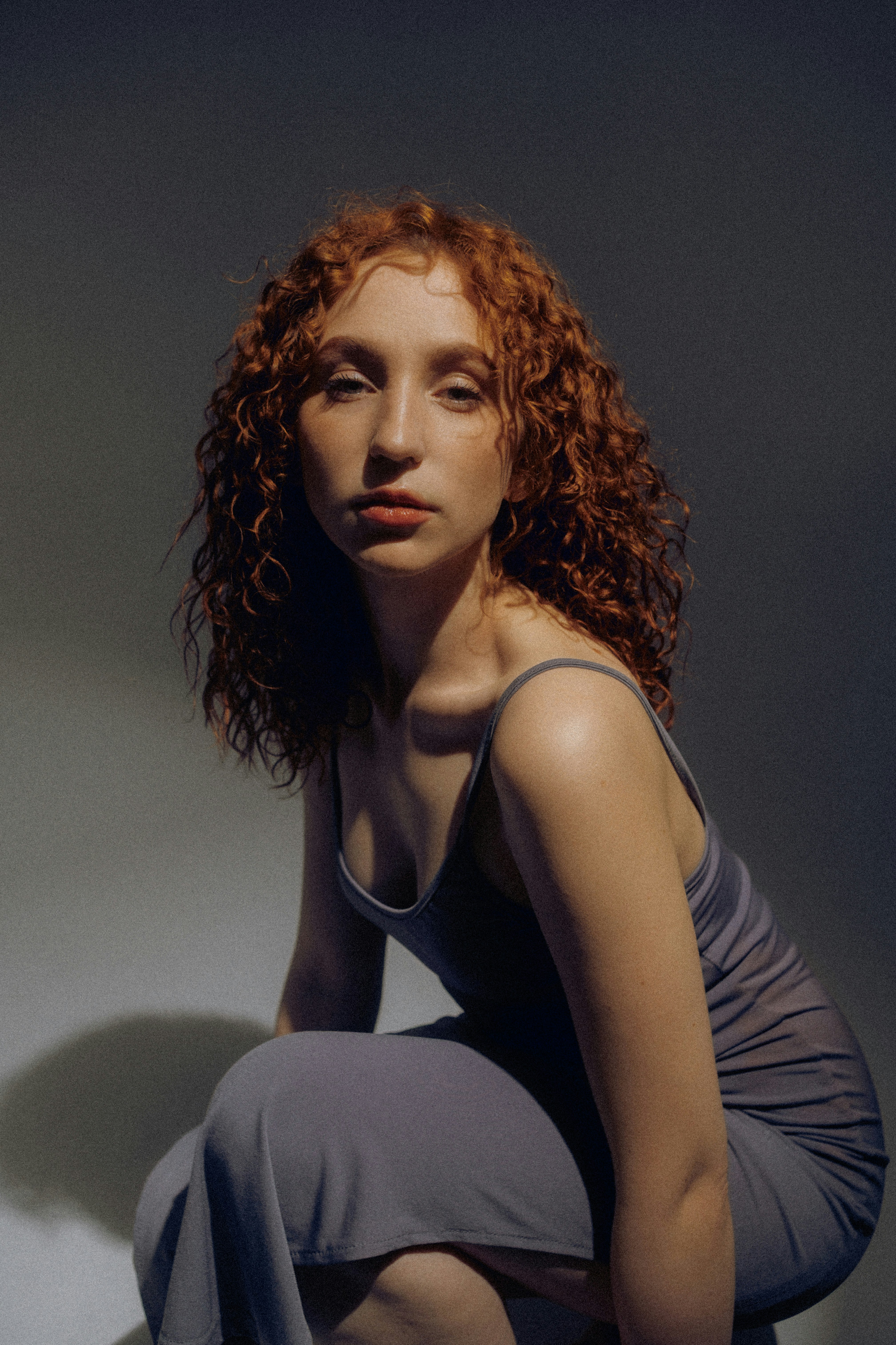 Red-Curls in Shadow: The Quiet Gaze