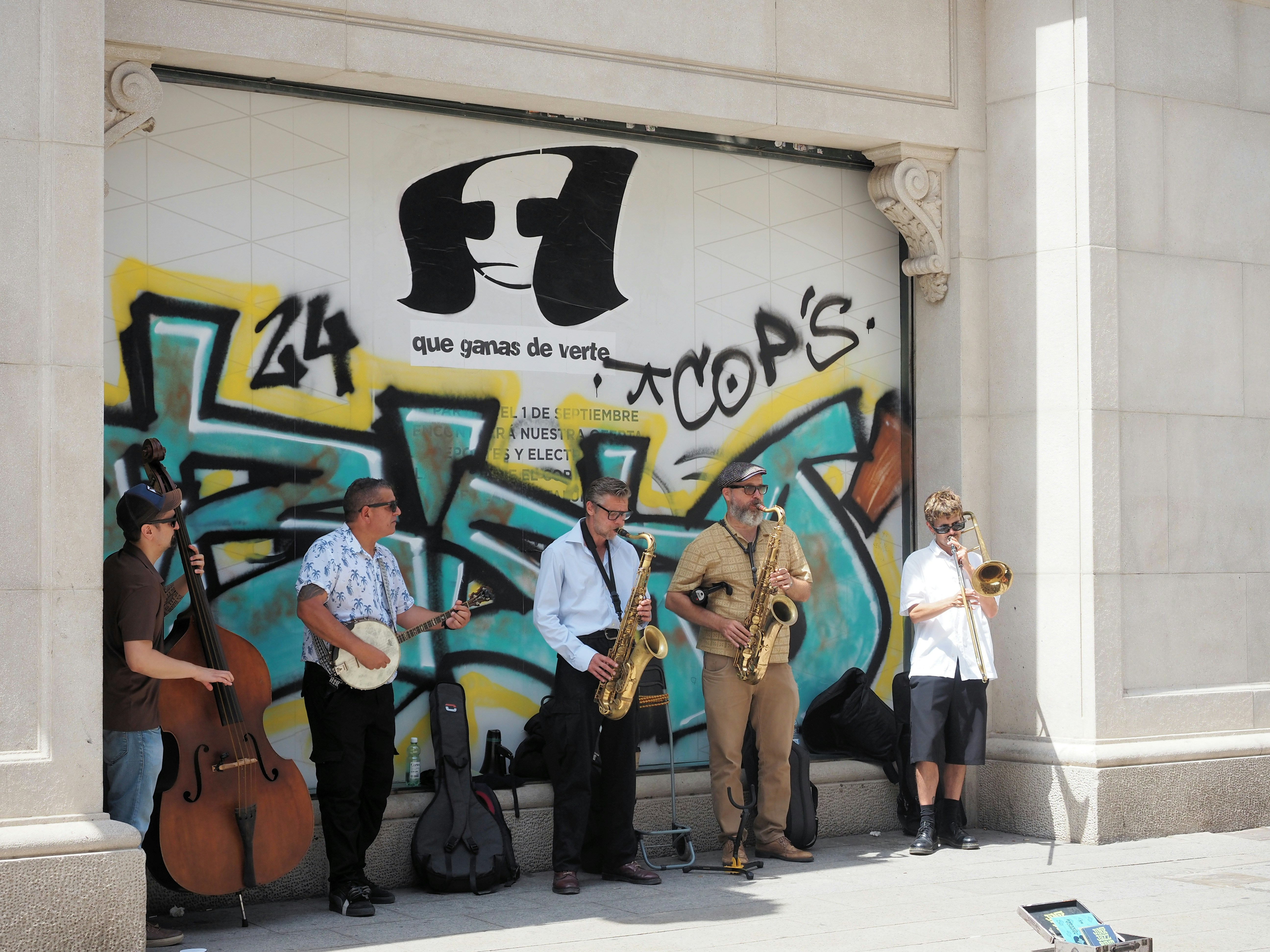 Groove on the Wall: A Street Jazz Ensemble Basks in Sunlight