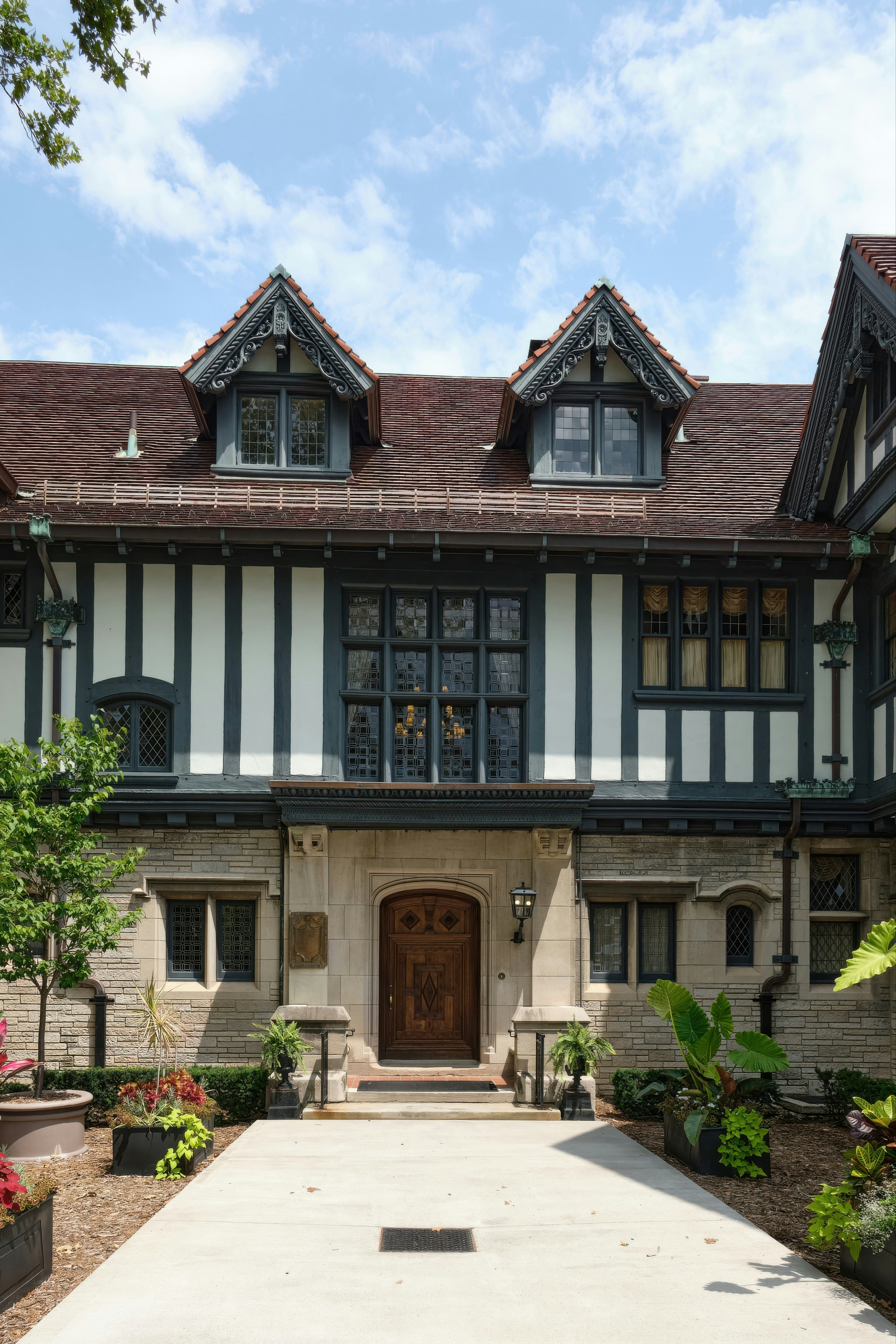 York-style Facade: Timbered elegance on a sunlit entry