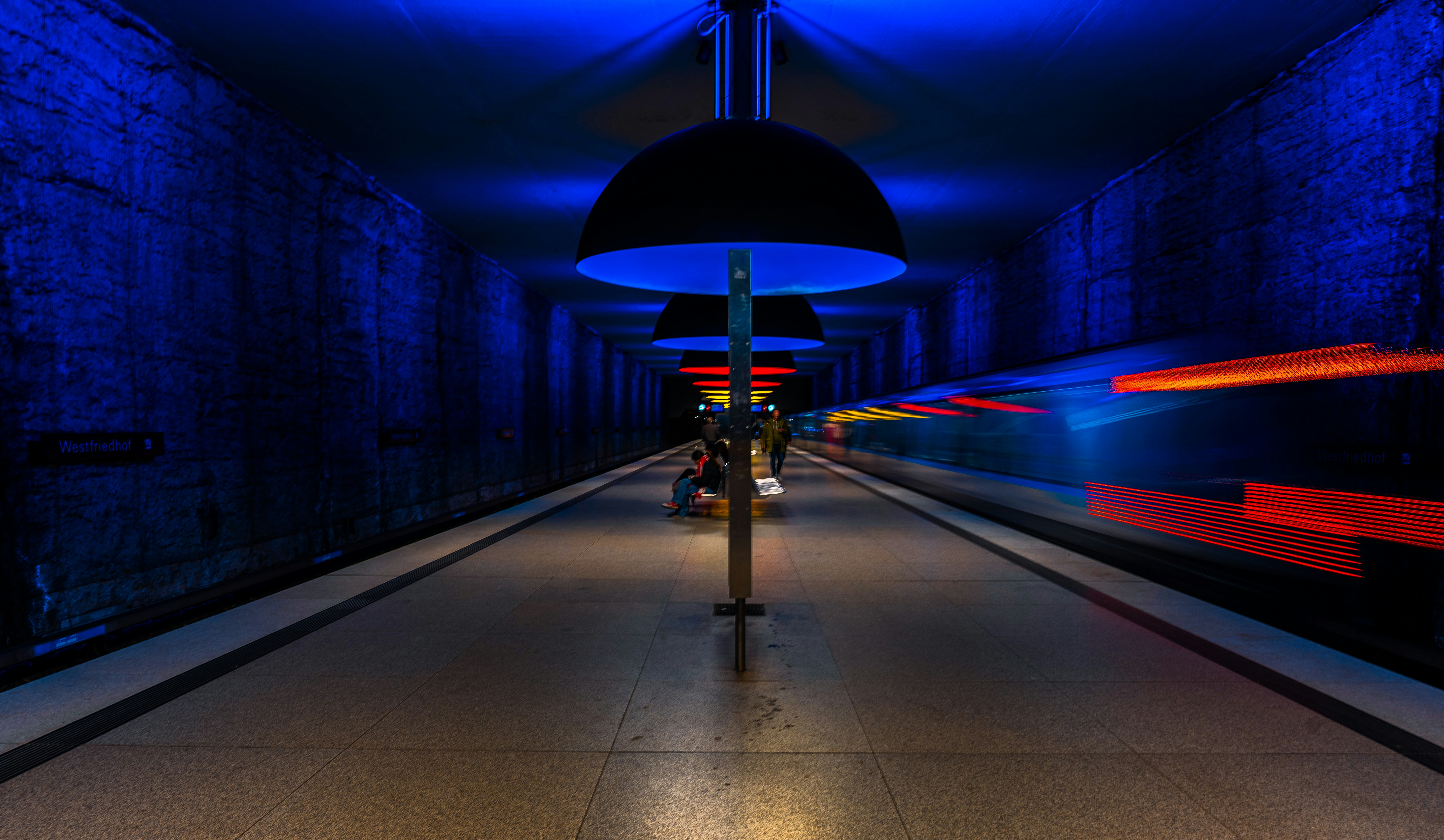 Midnight Transit: Blue Aura in a Quiet Subway Platform
