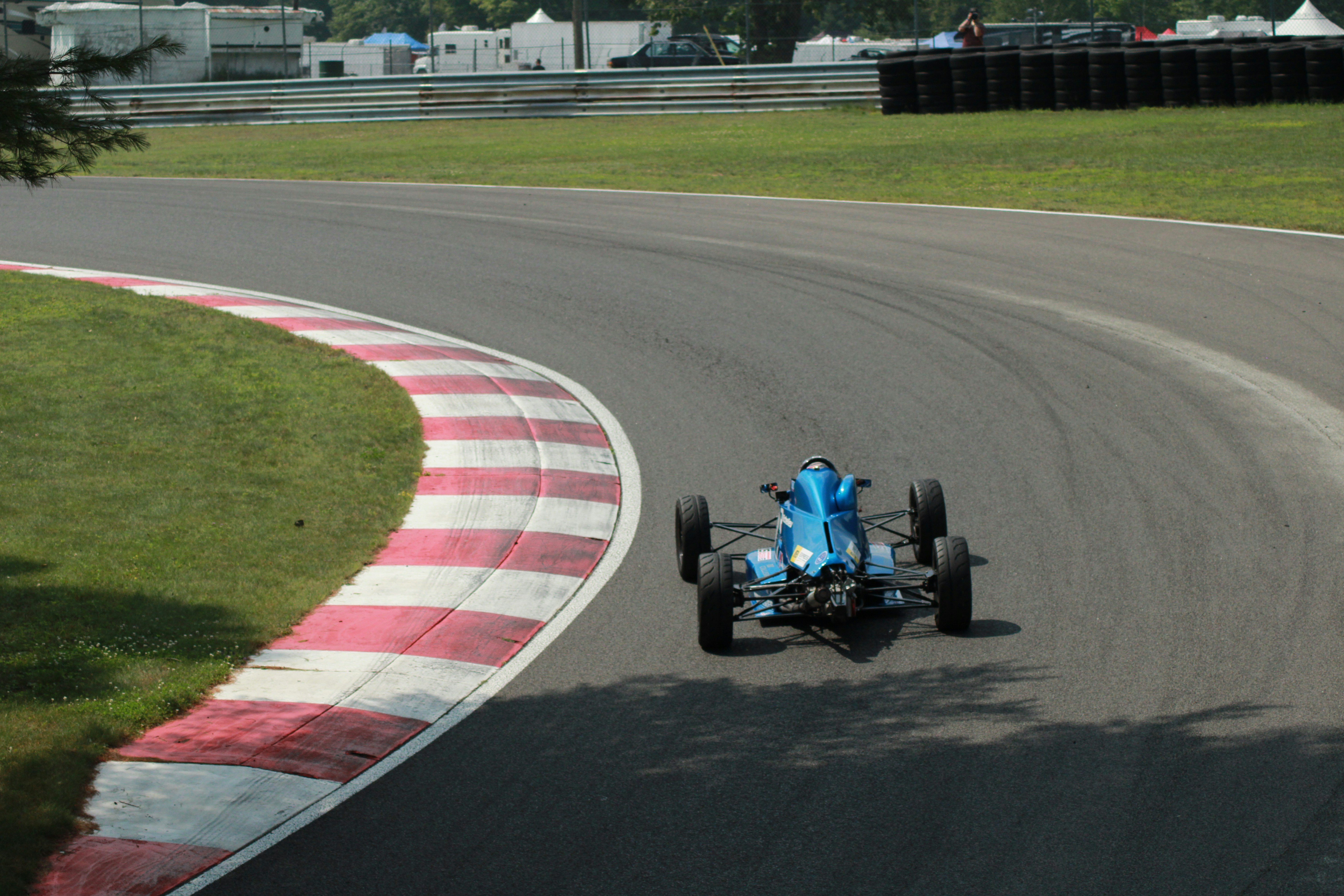 Blue Formula: A lone racer slices through the curve