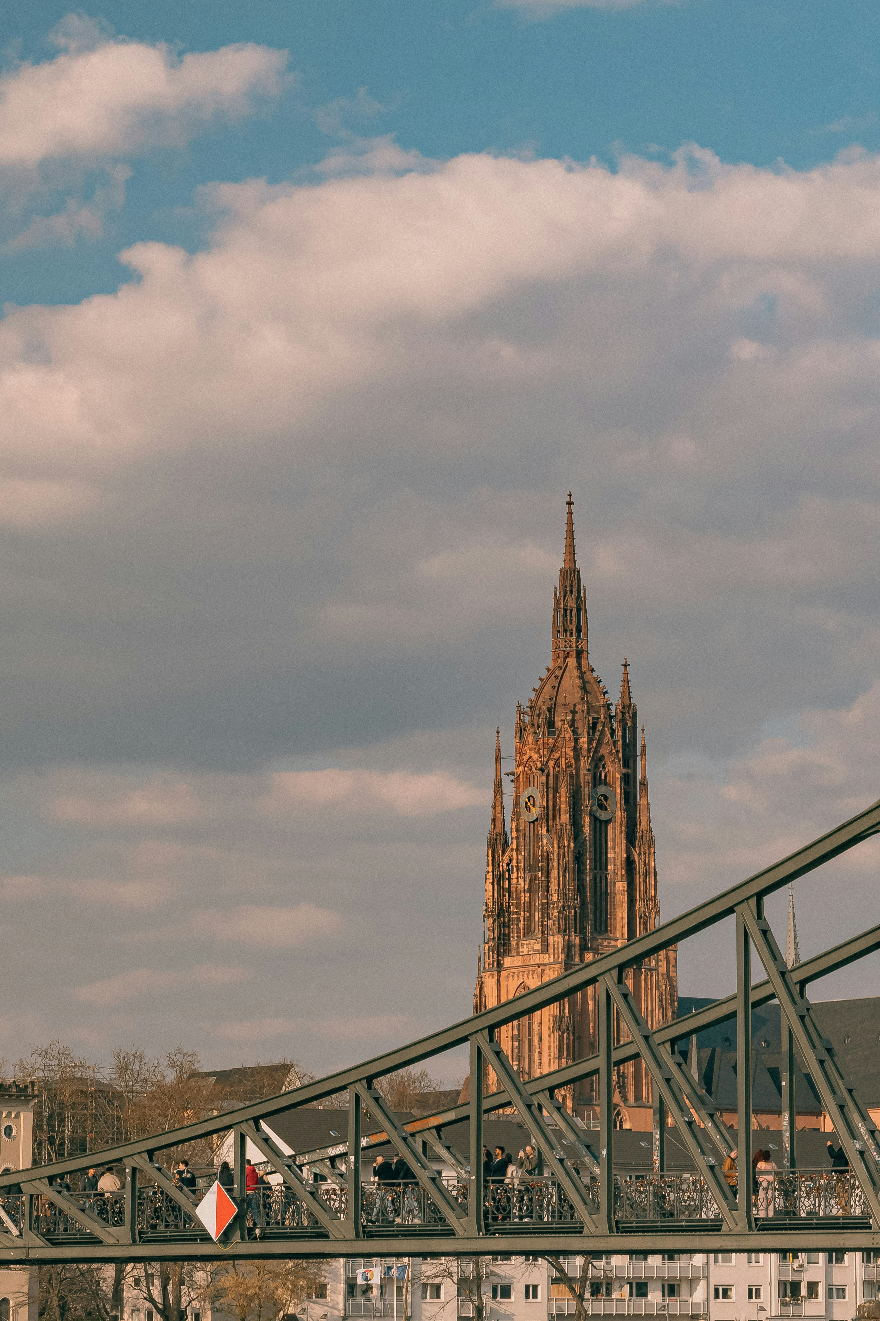 Gothic Spire Rising Over a Glassy Skybridge