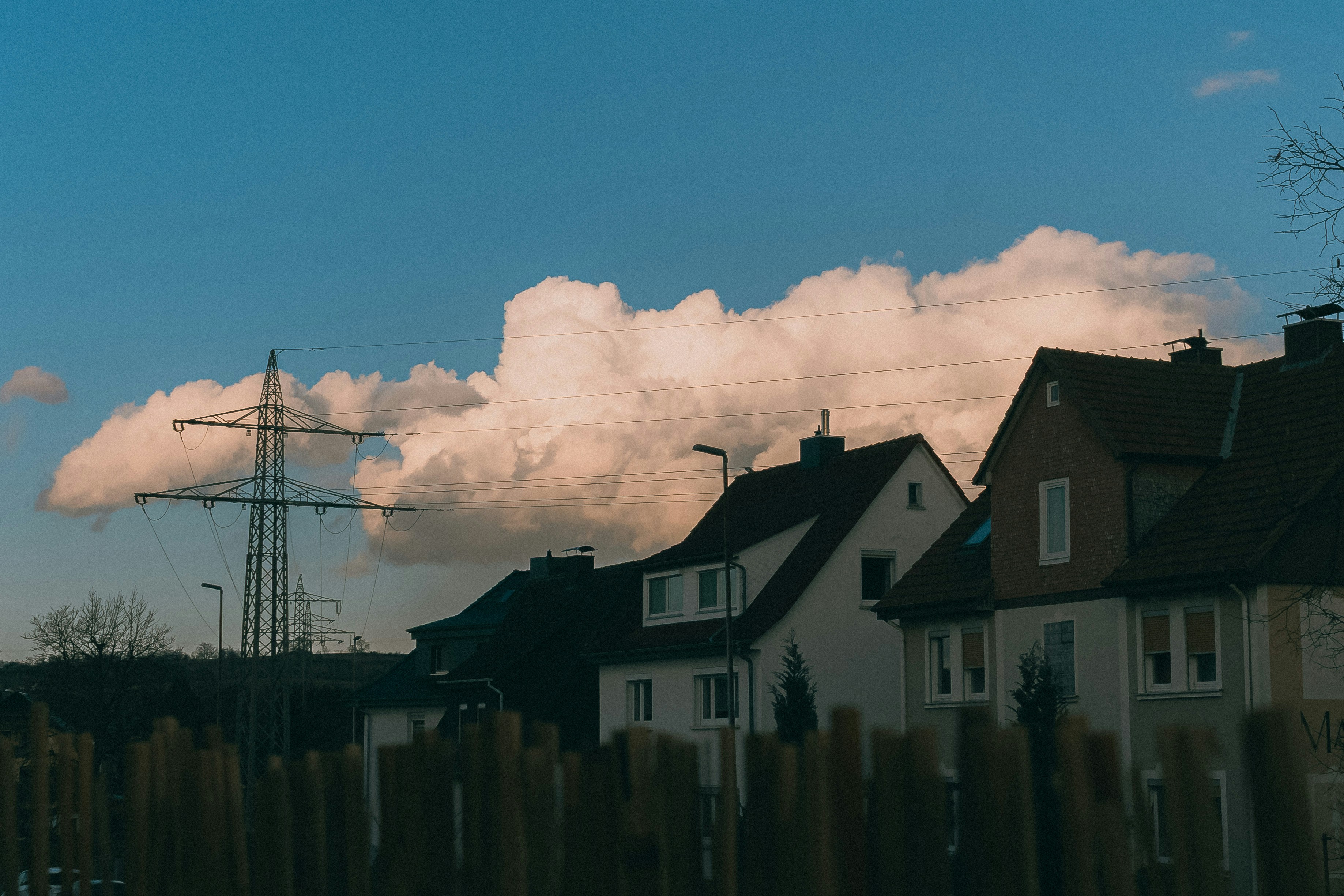 Clouds Over a Quiet Suburban Row